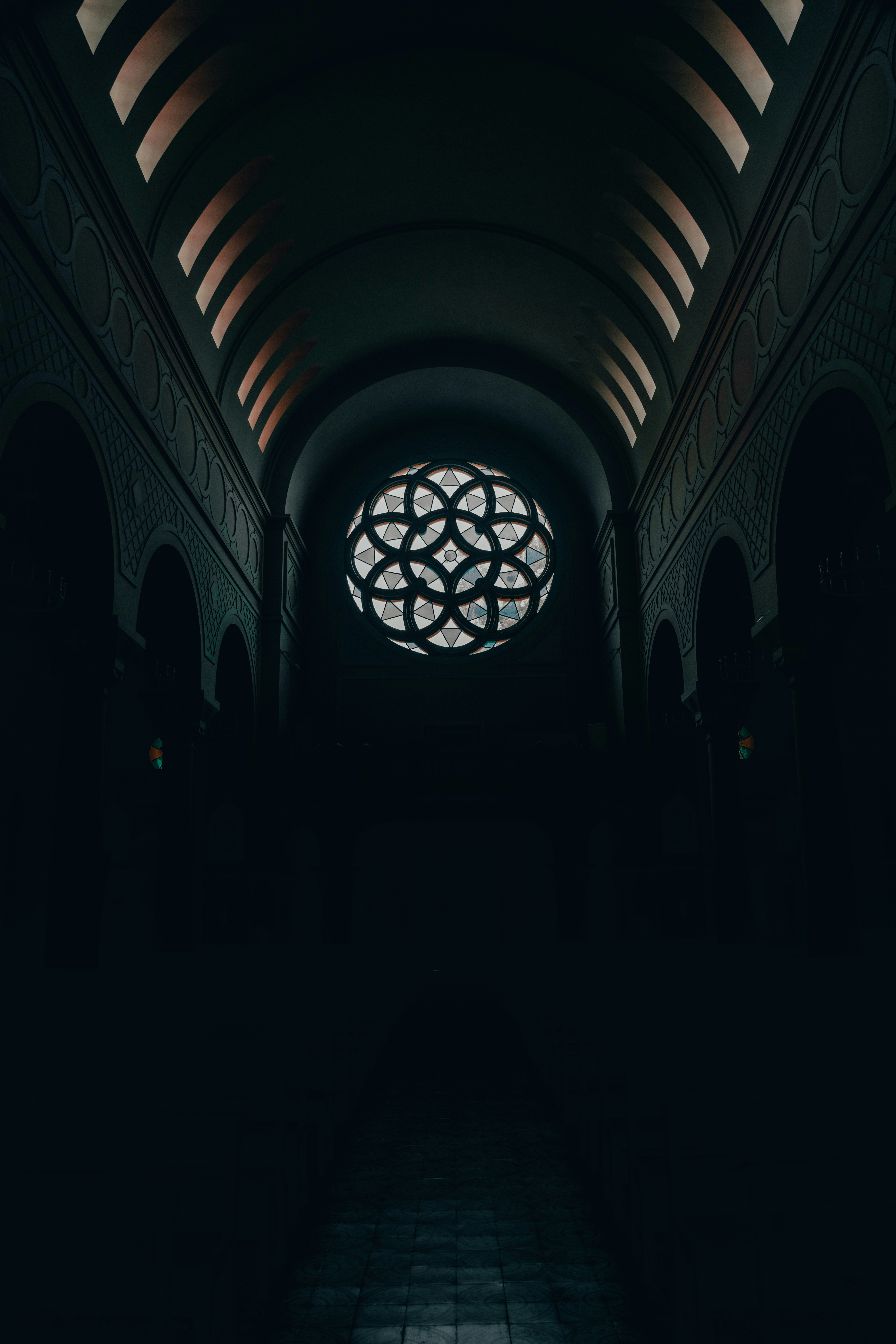 Circular Window at the End of the Hall: A Study in Darkness and Geometry