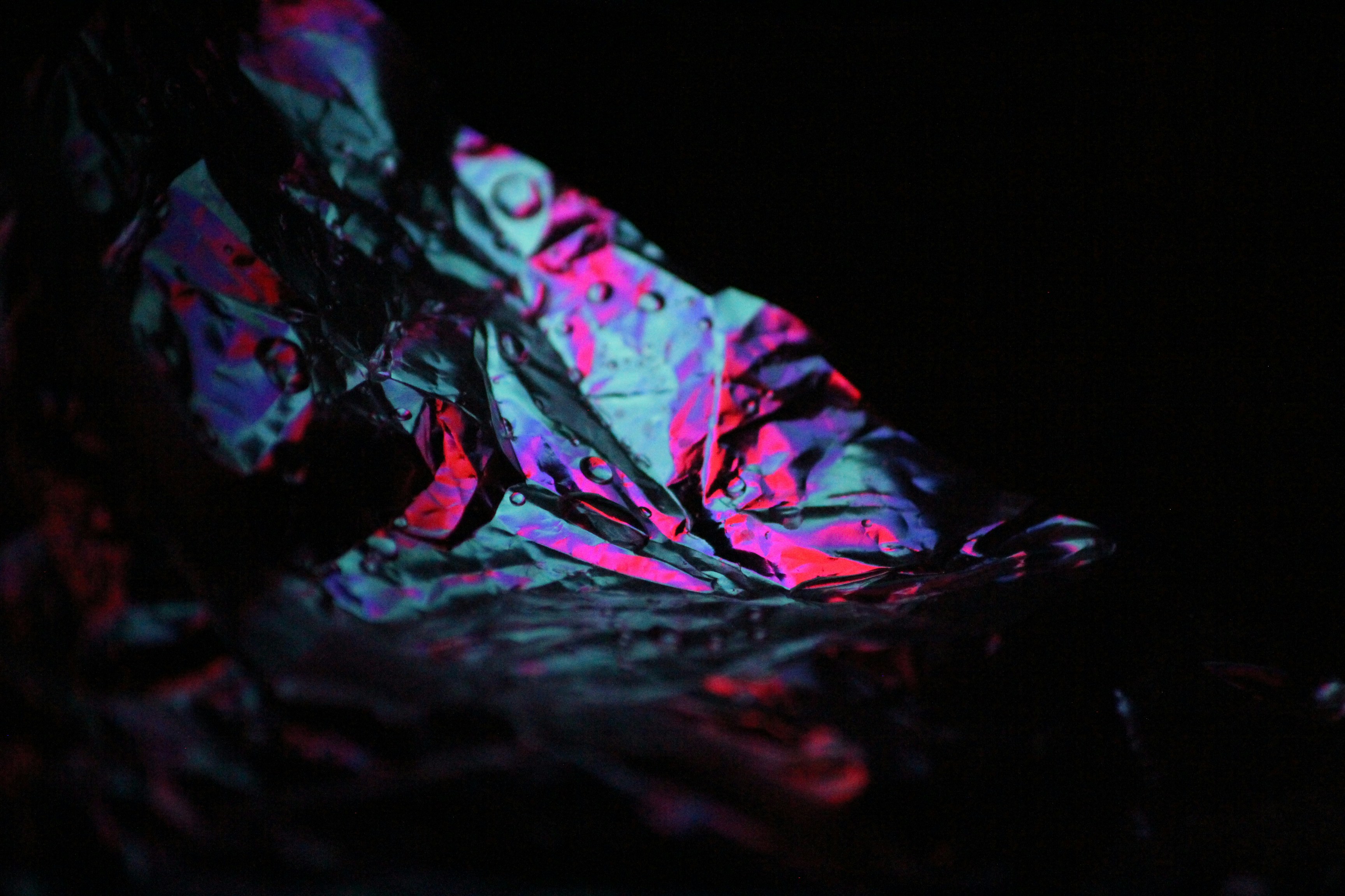 Neon-radiant Crumples: A Folded Lightscape
