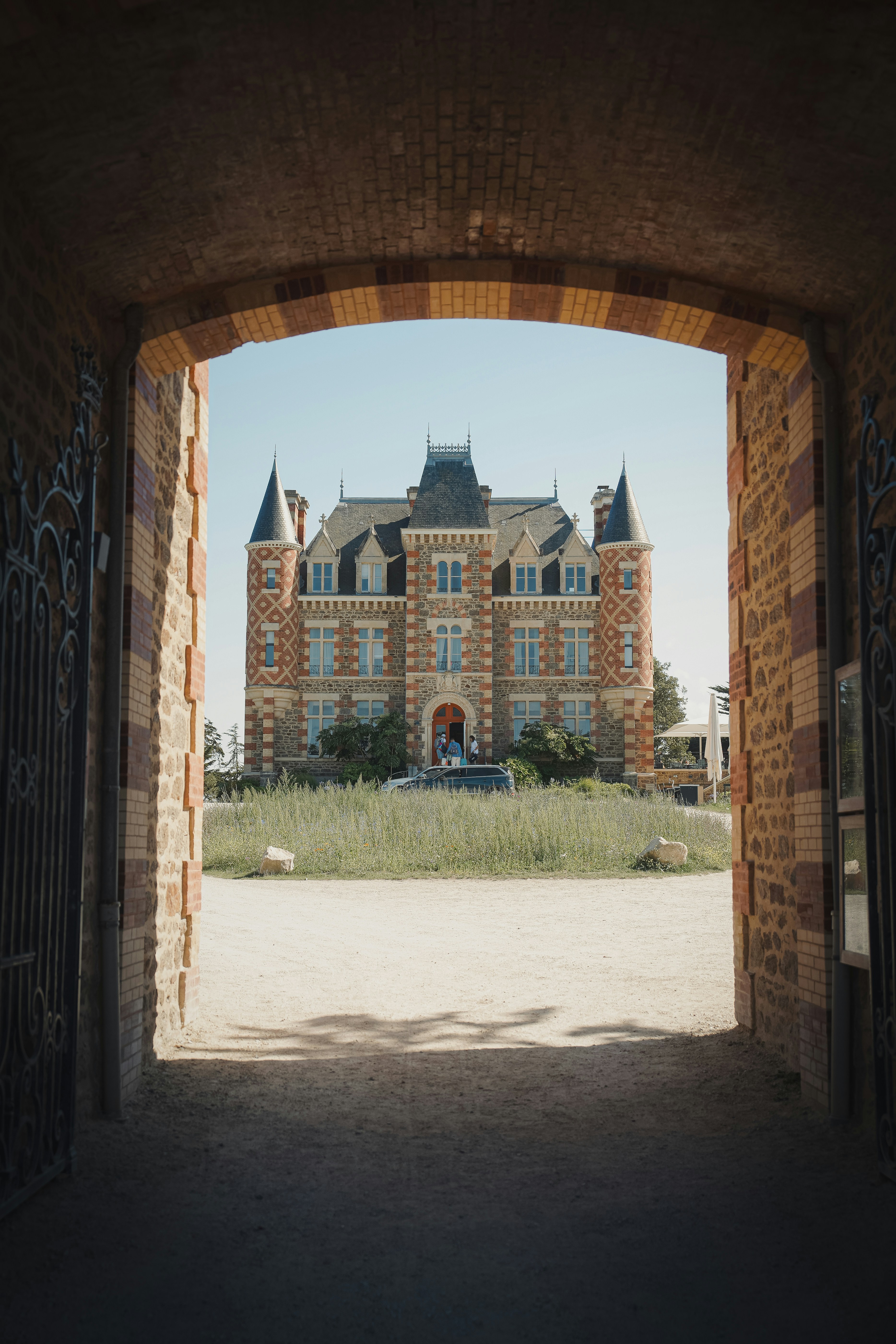 Gateways to a Brick-Textured Castle