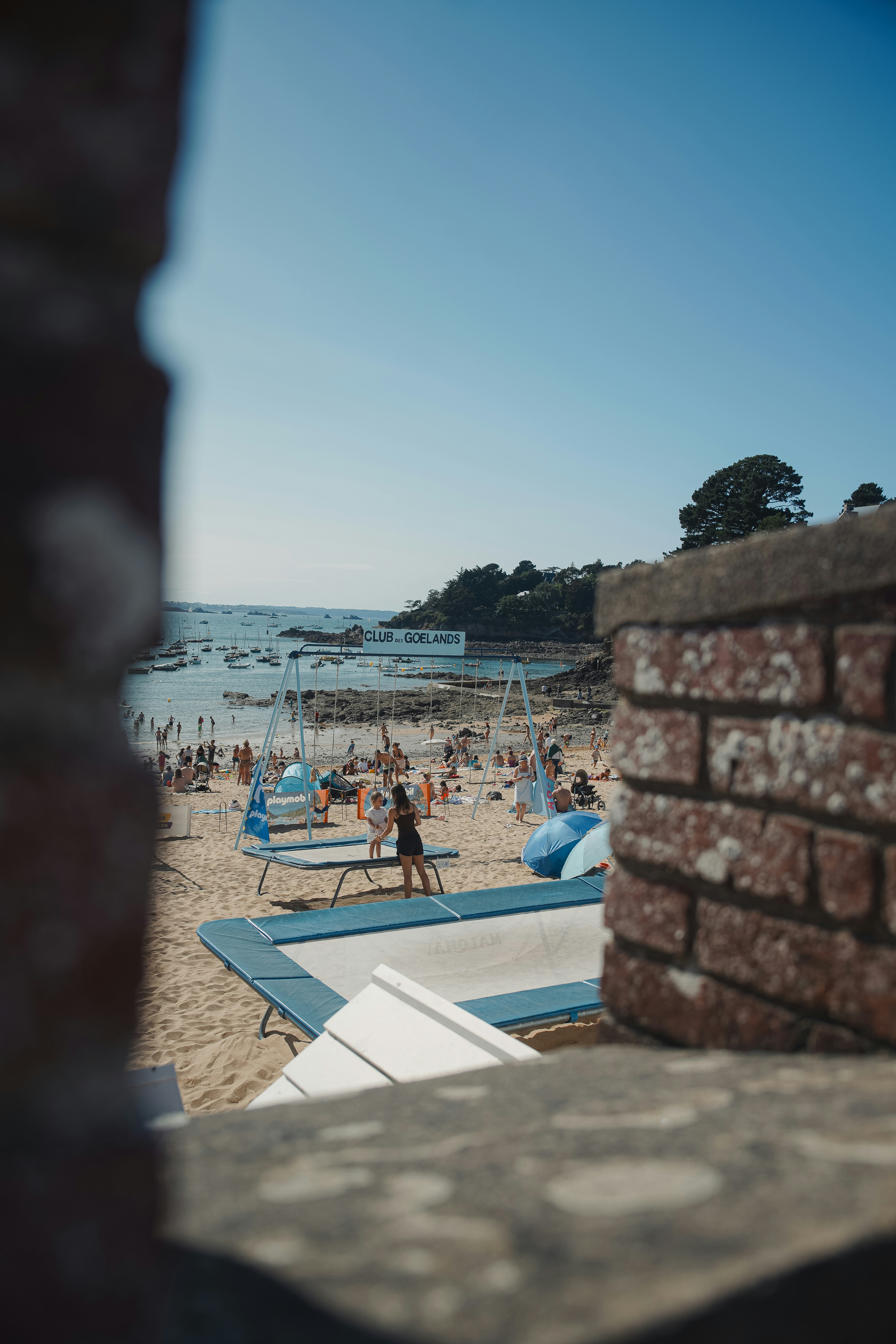 Beach Volley and Lifeguard A-frame Under the Arch of Brick
