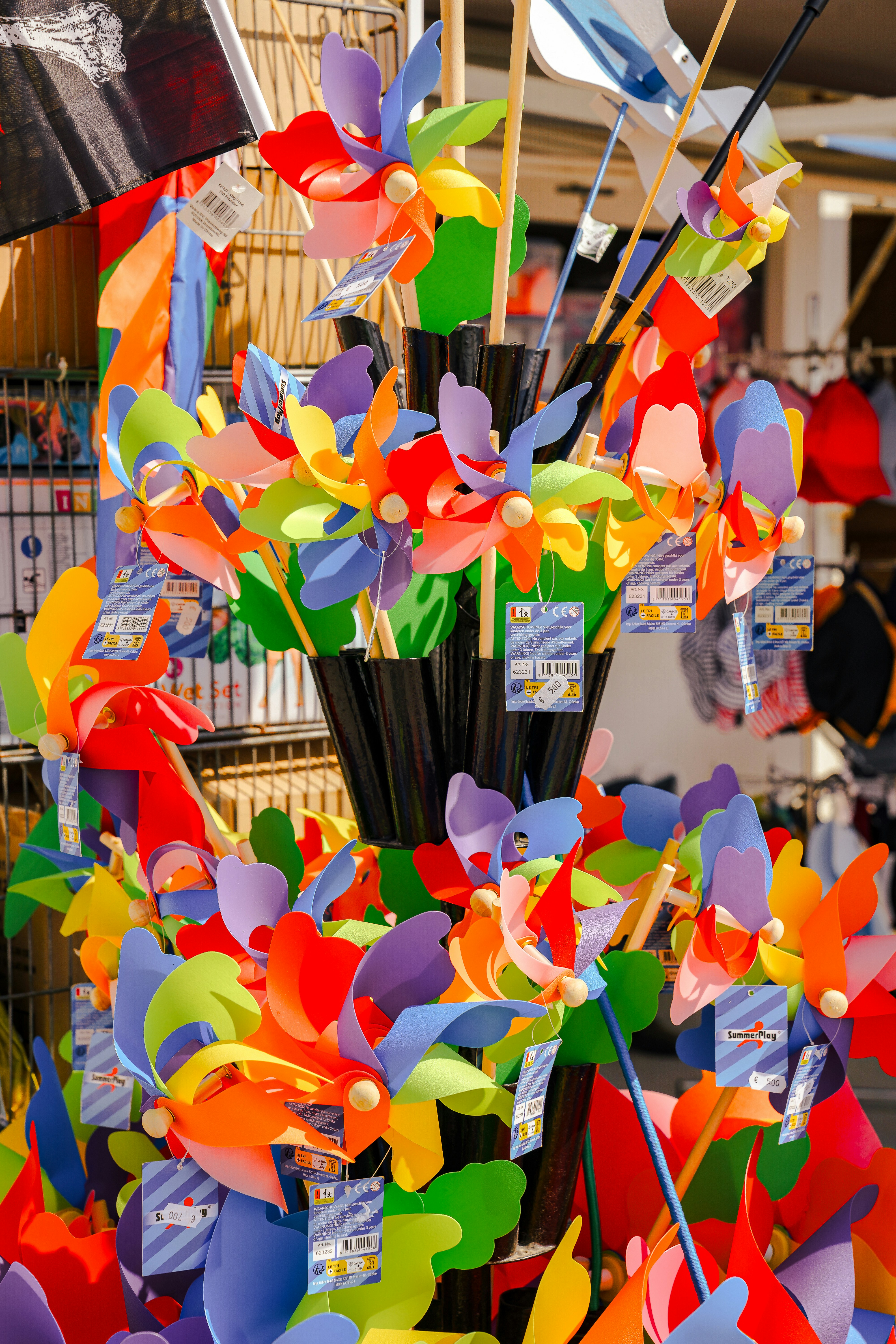 Colorful Windmill Garden at a Market Stall