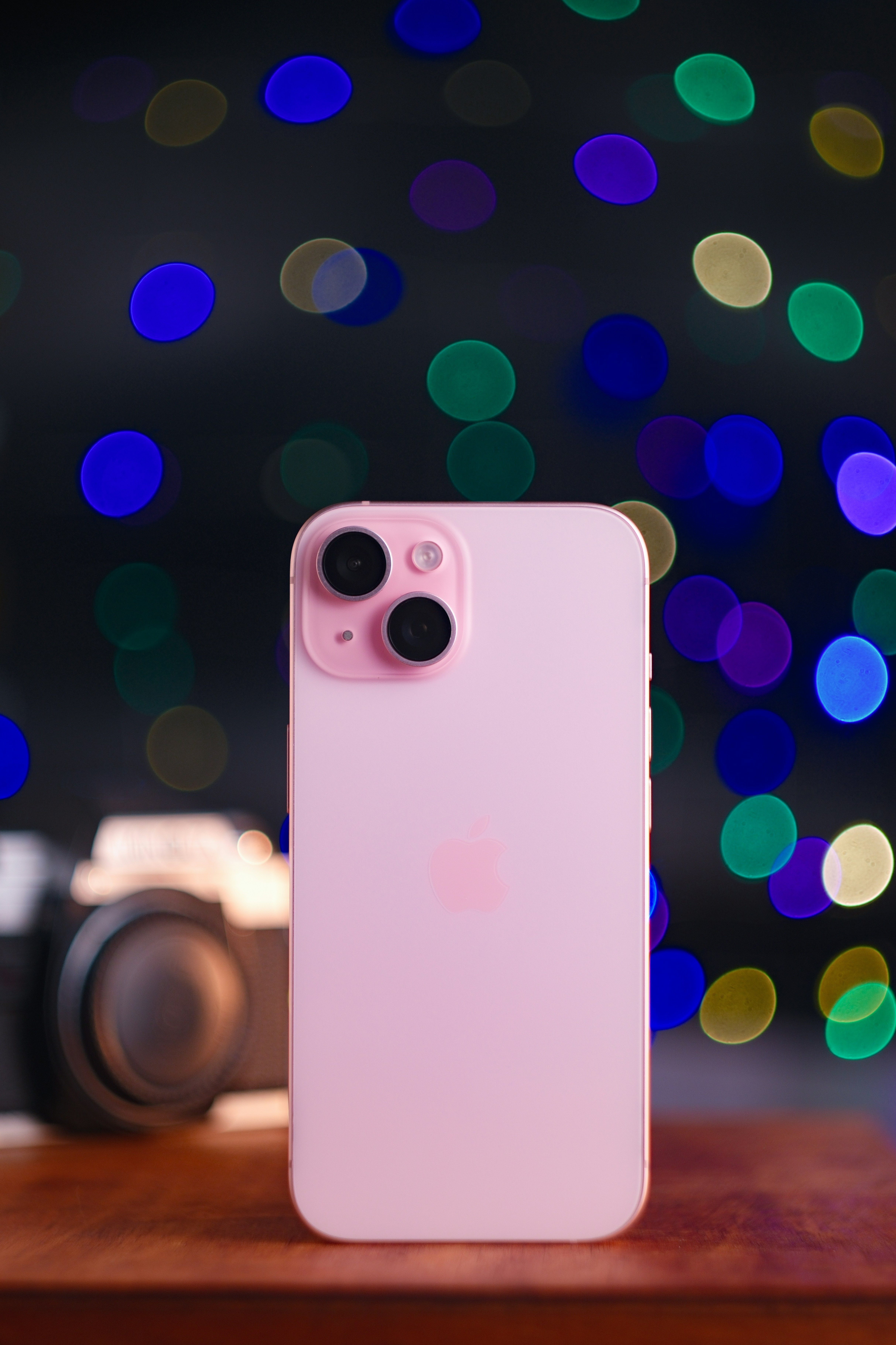 Pink Phone in Focus: Neon Orbs Backlit