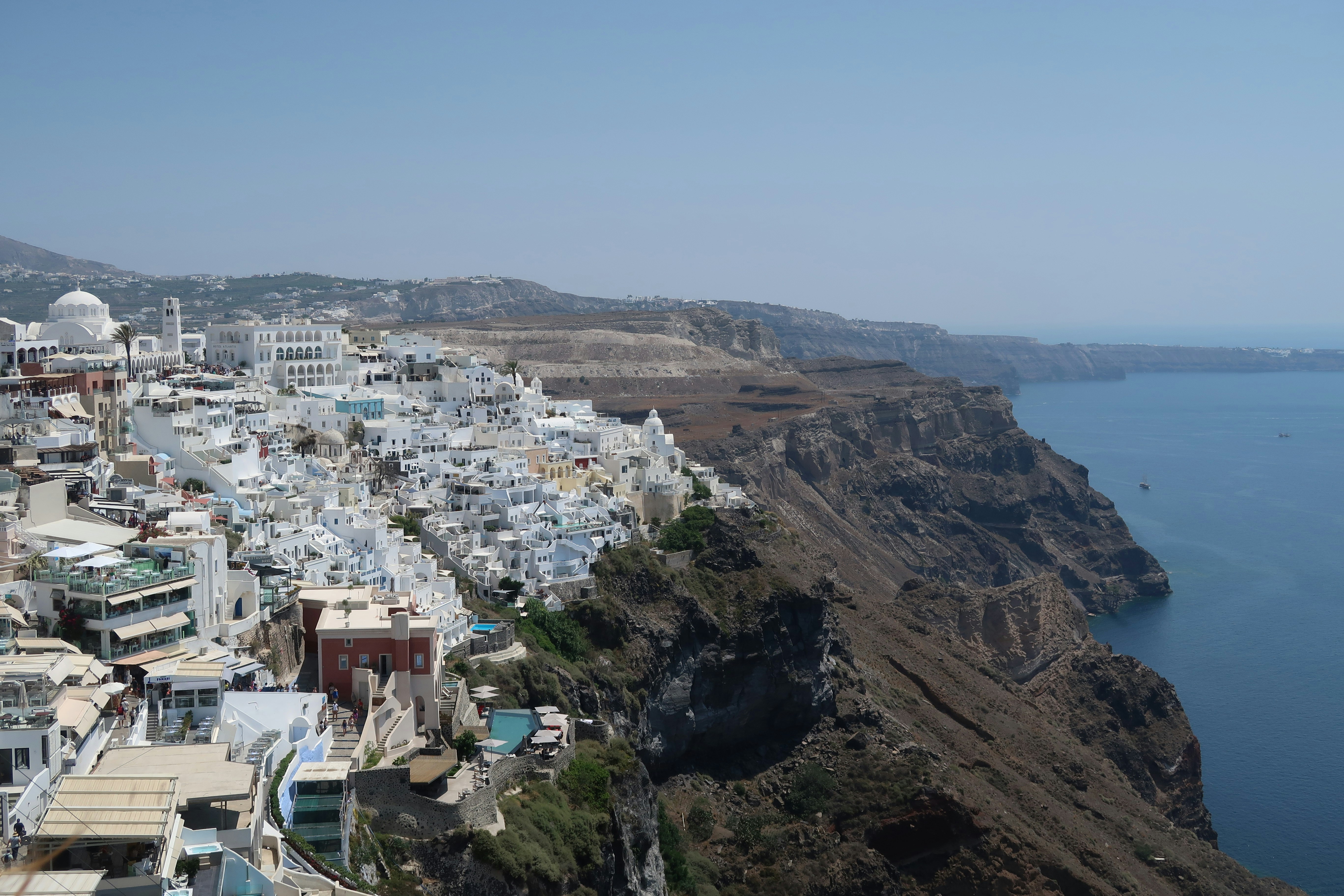 Aegean Cliffside Village: Whitewashed Terrace Homes Clinging to the Sea