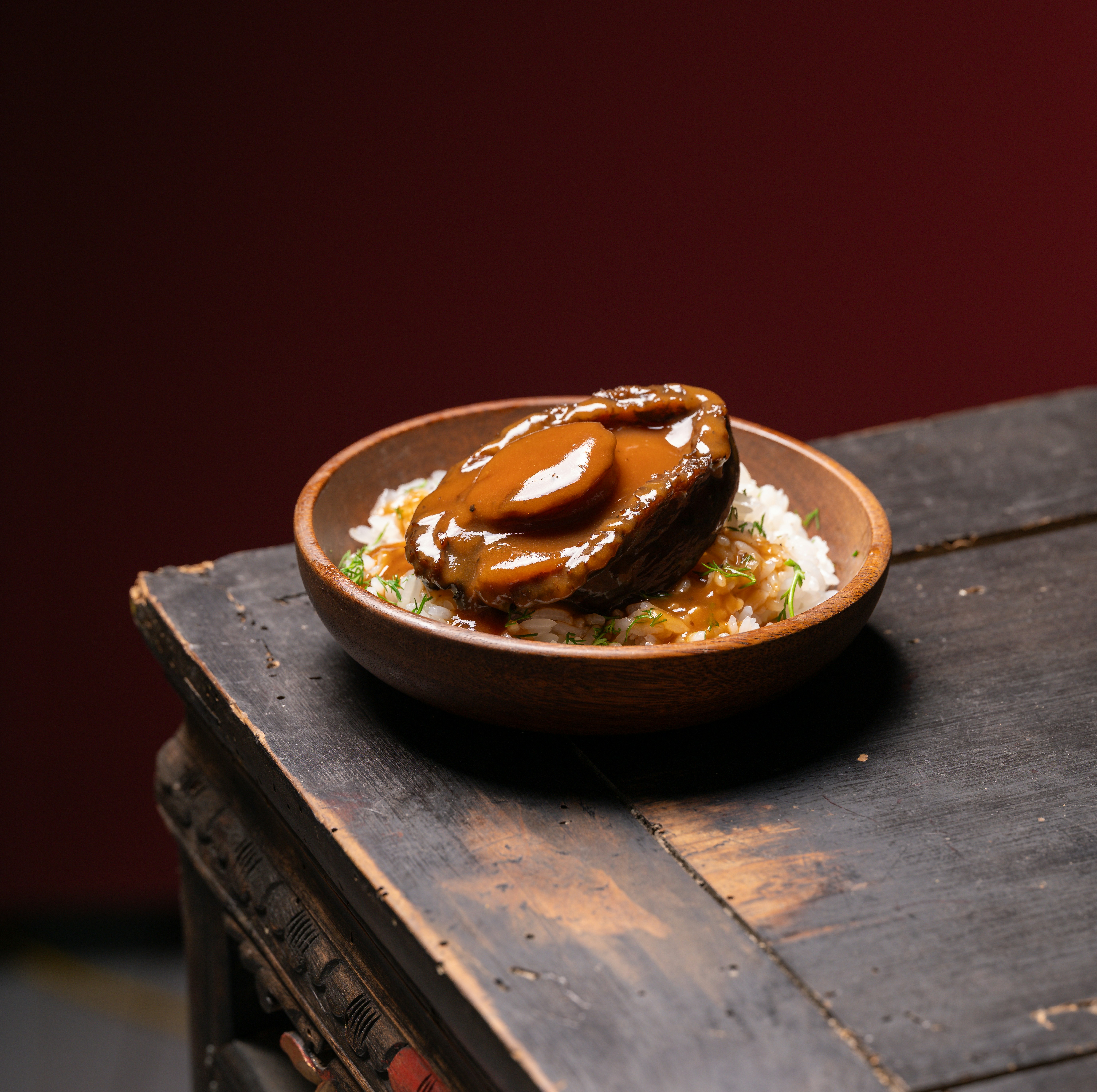 Stitched Umami: A Dish on Weathered Wood