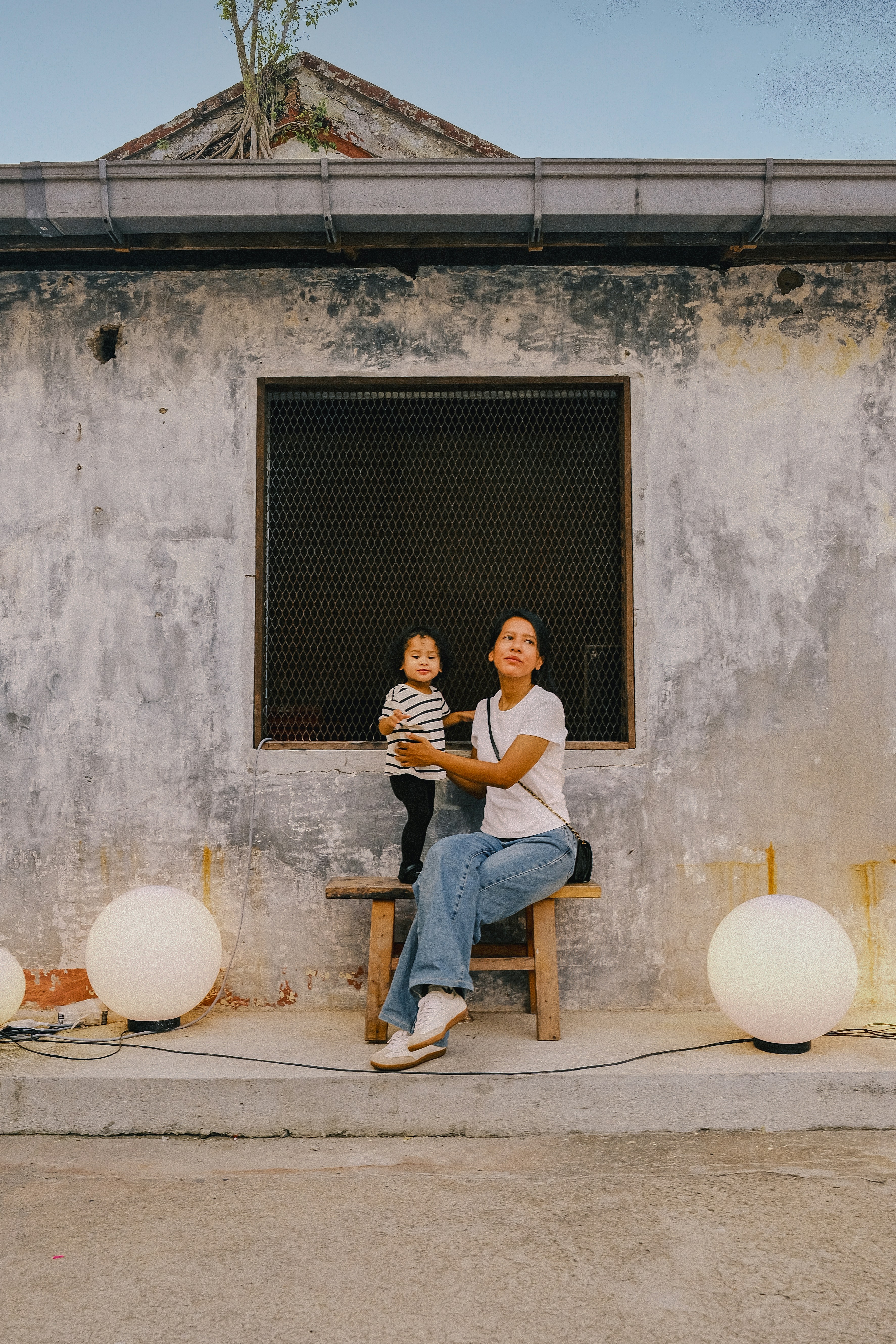 Mother and Child on a Weathered Wall