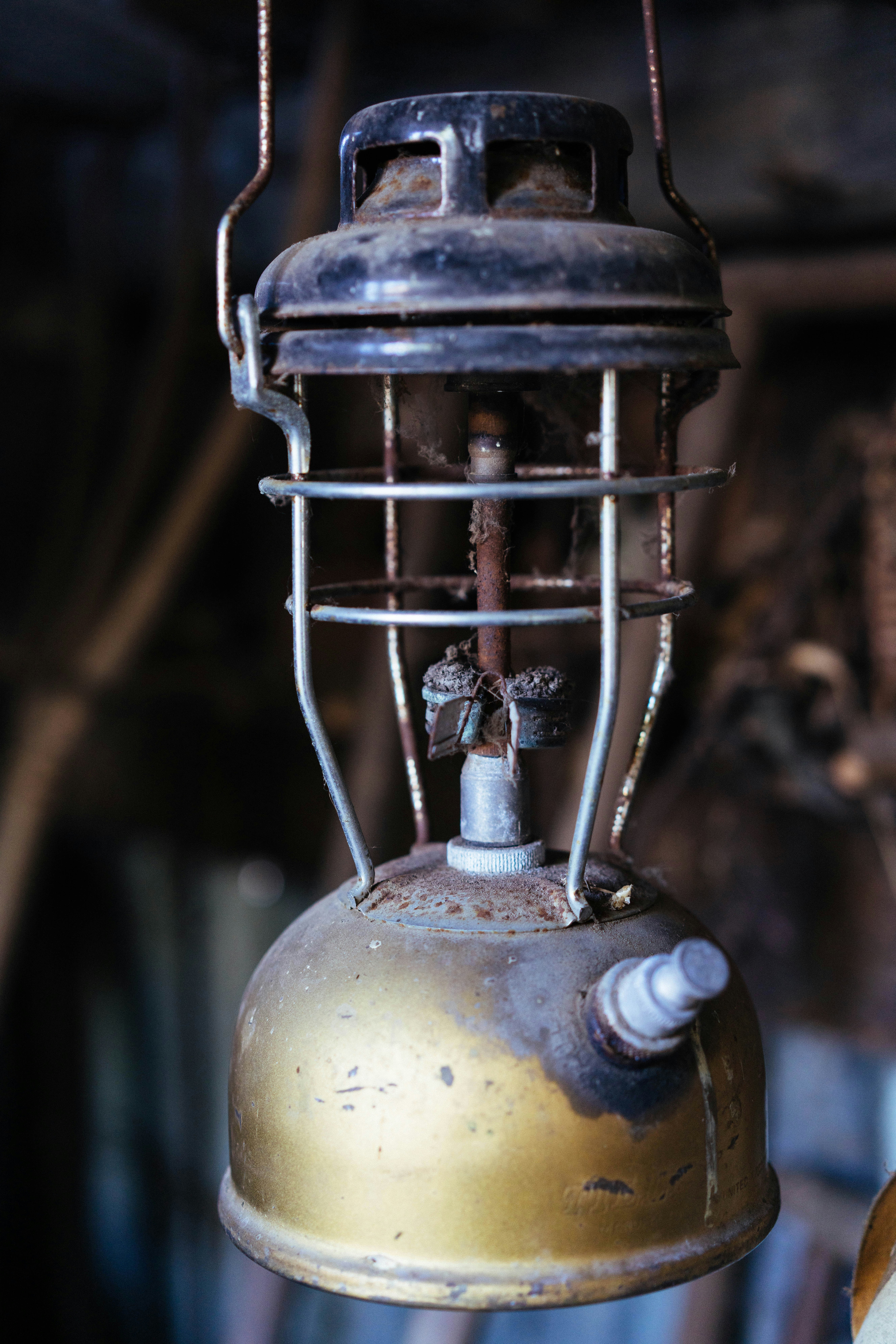 Dusty Lantern in a Silent Workshop