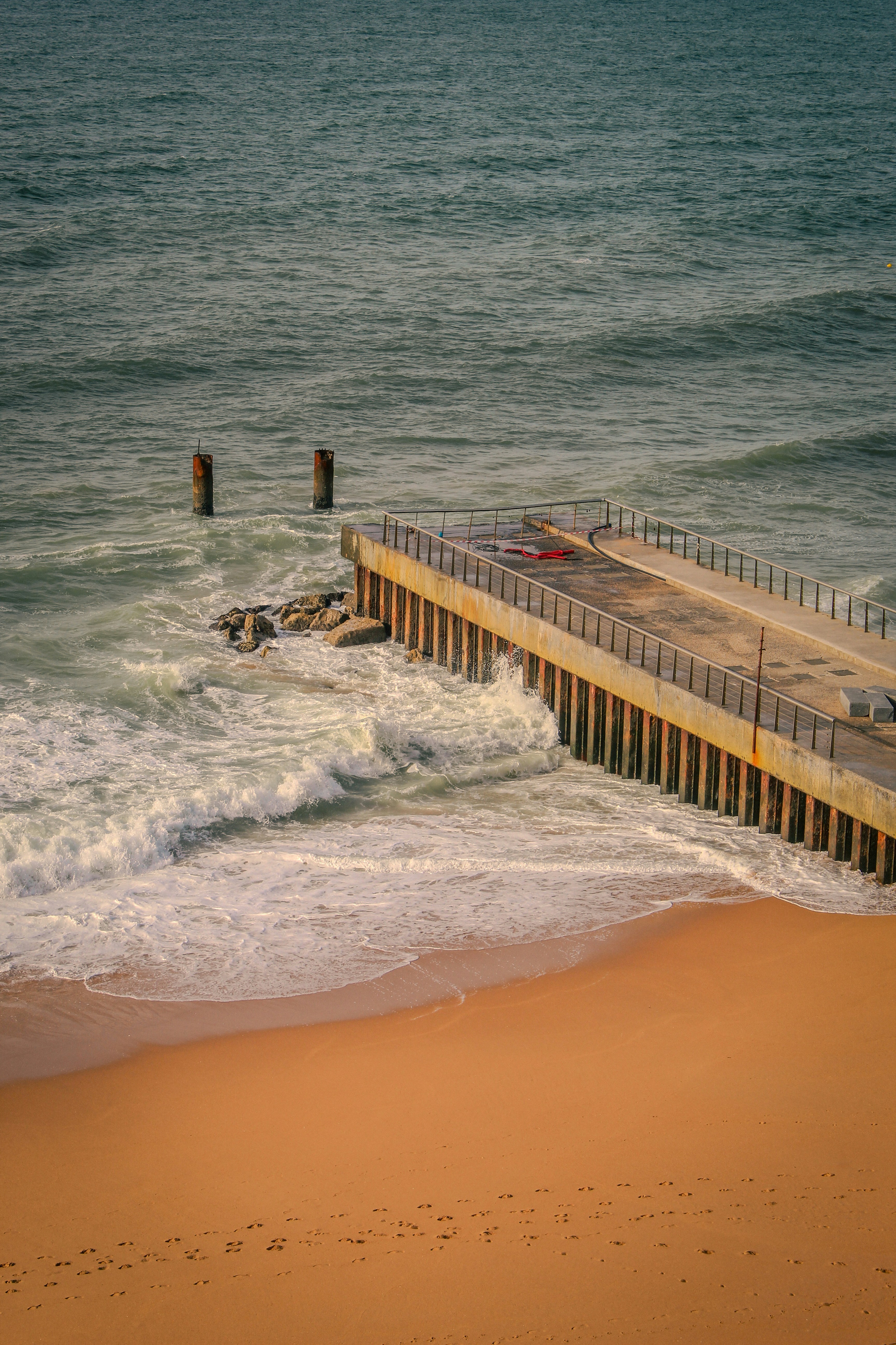 Pier over the Sunset Waves: A Quiet Coastal Moment