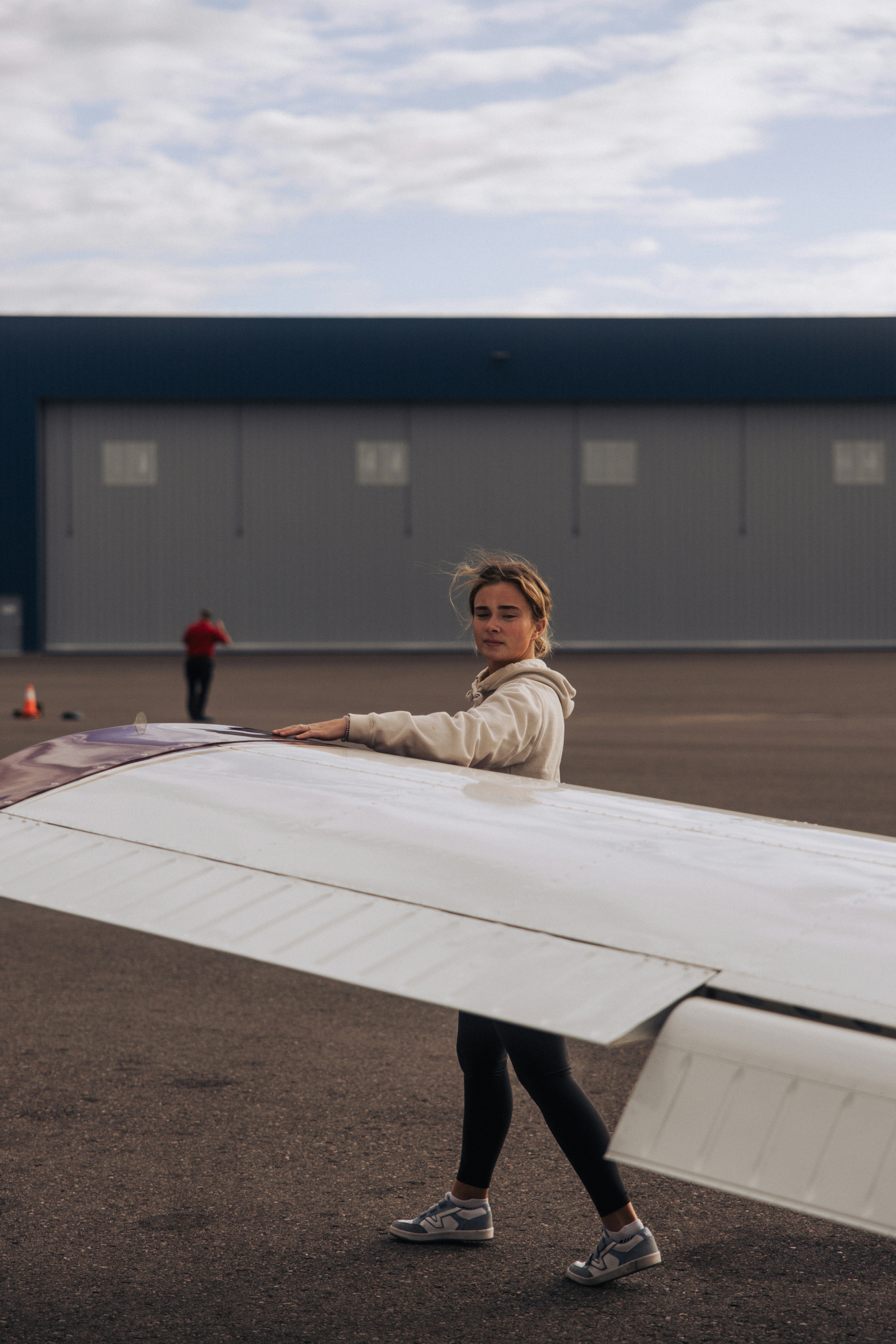 Winged Quiet: A Gracious Moment at the Edge of the Tarmac