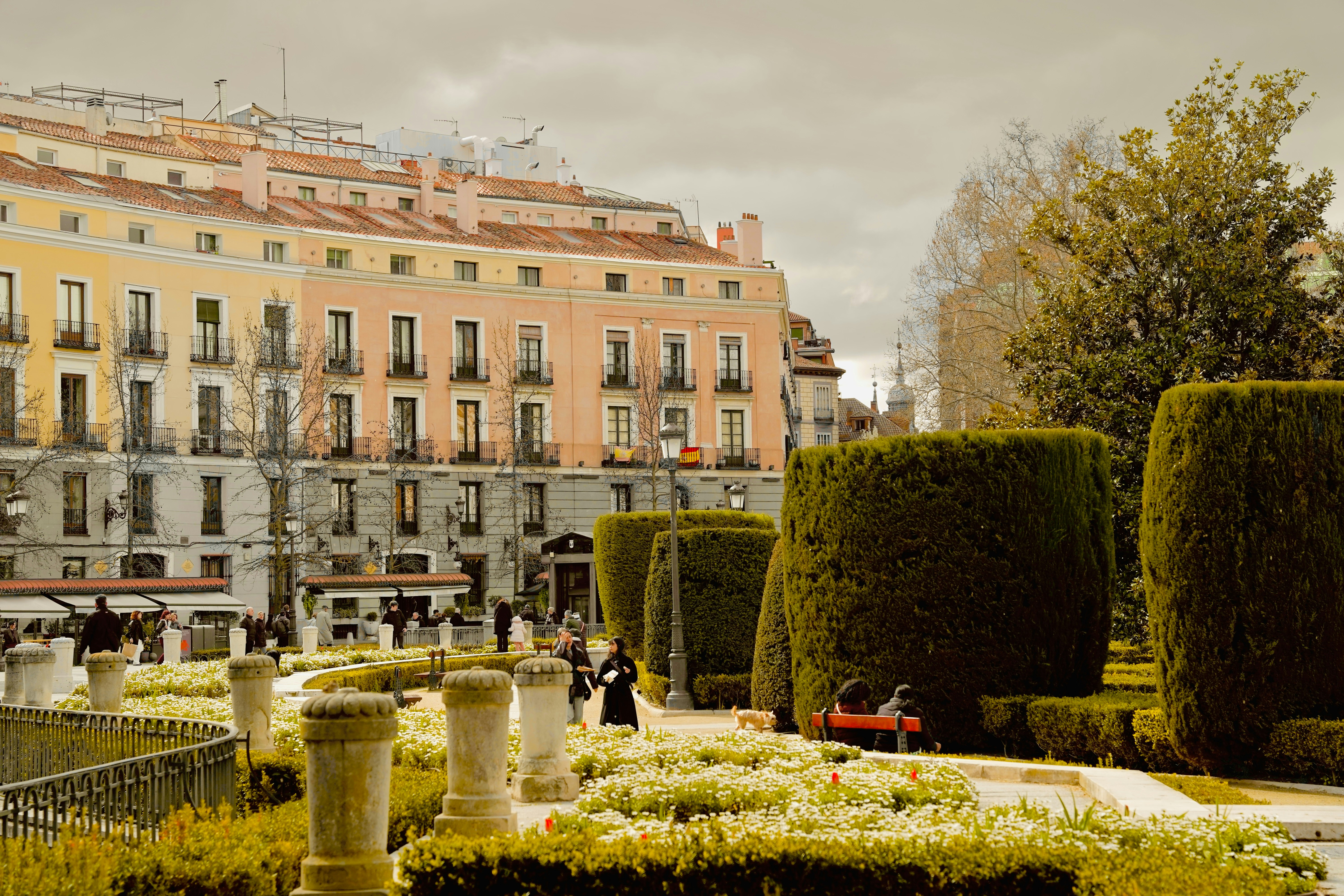 Parisian Garden in Front of Colorful Townhouses