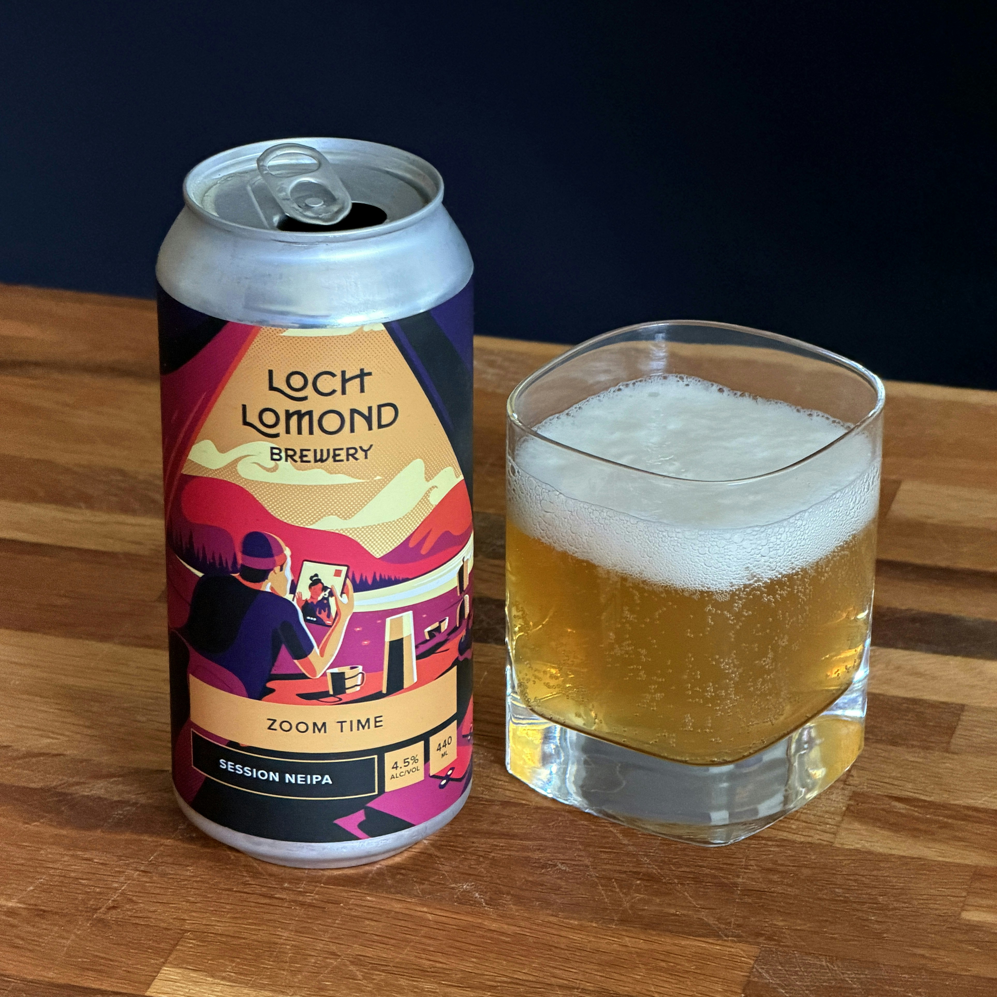 Zoom Time: A Sunset-Inspired Lager Stands Beside a Glass