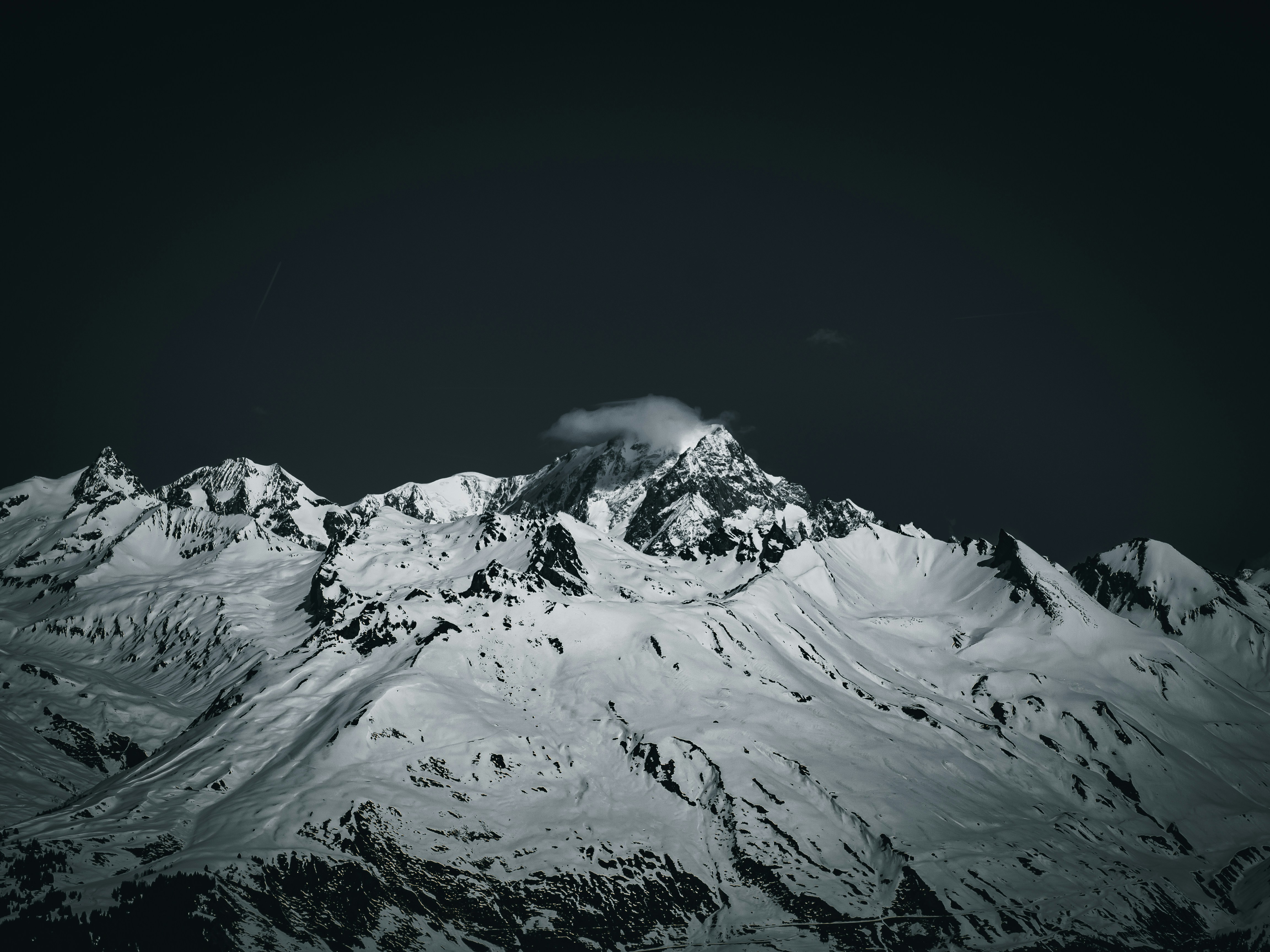 Snow-Crowned Peaks Under a Velvet Sky