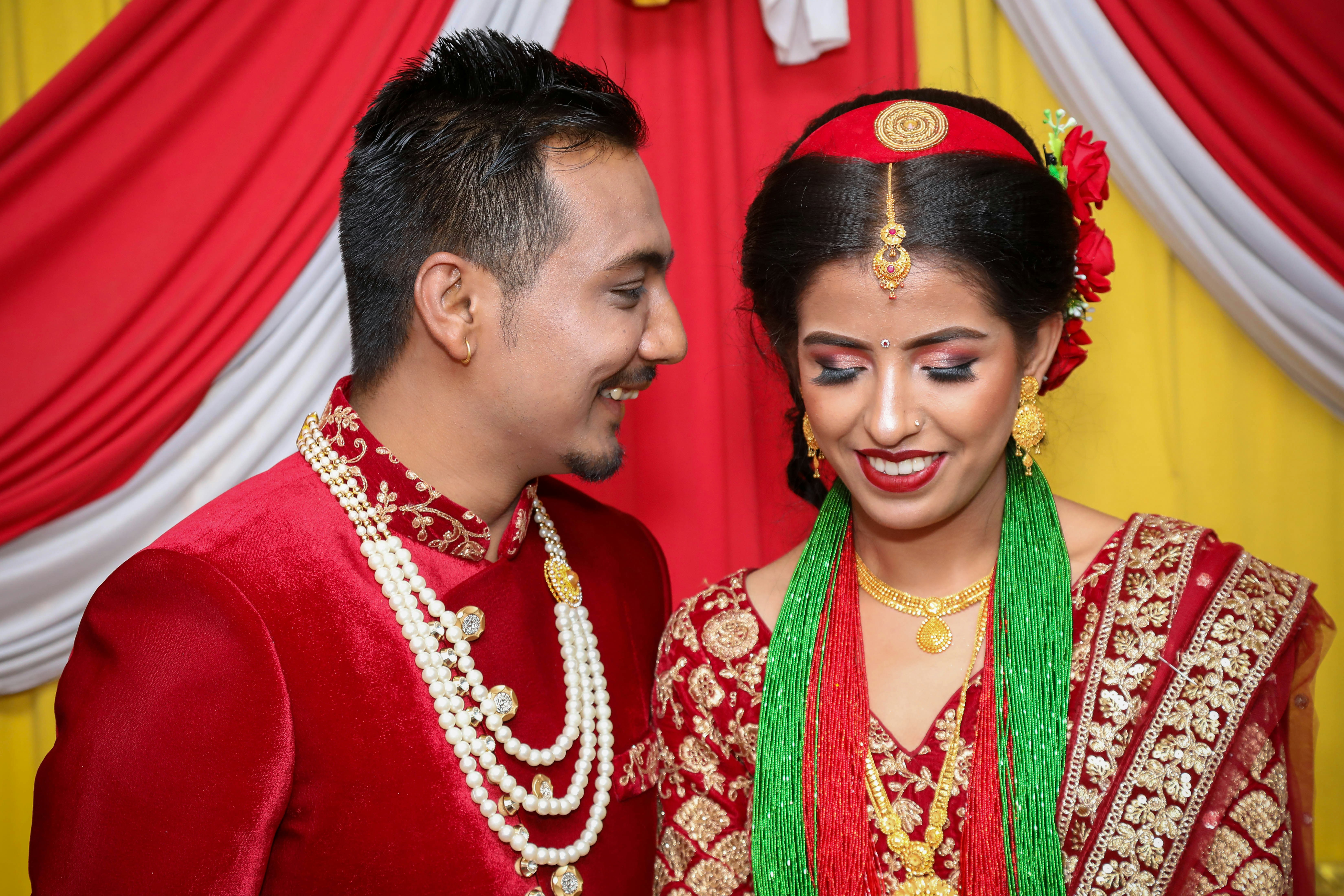 Red Threads of Union: A Moment Between Bride and Groom