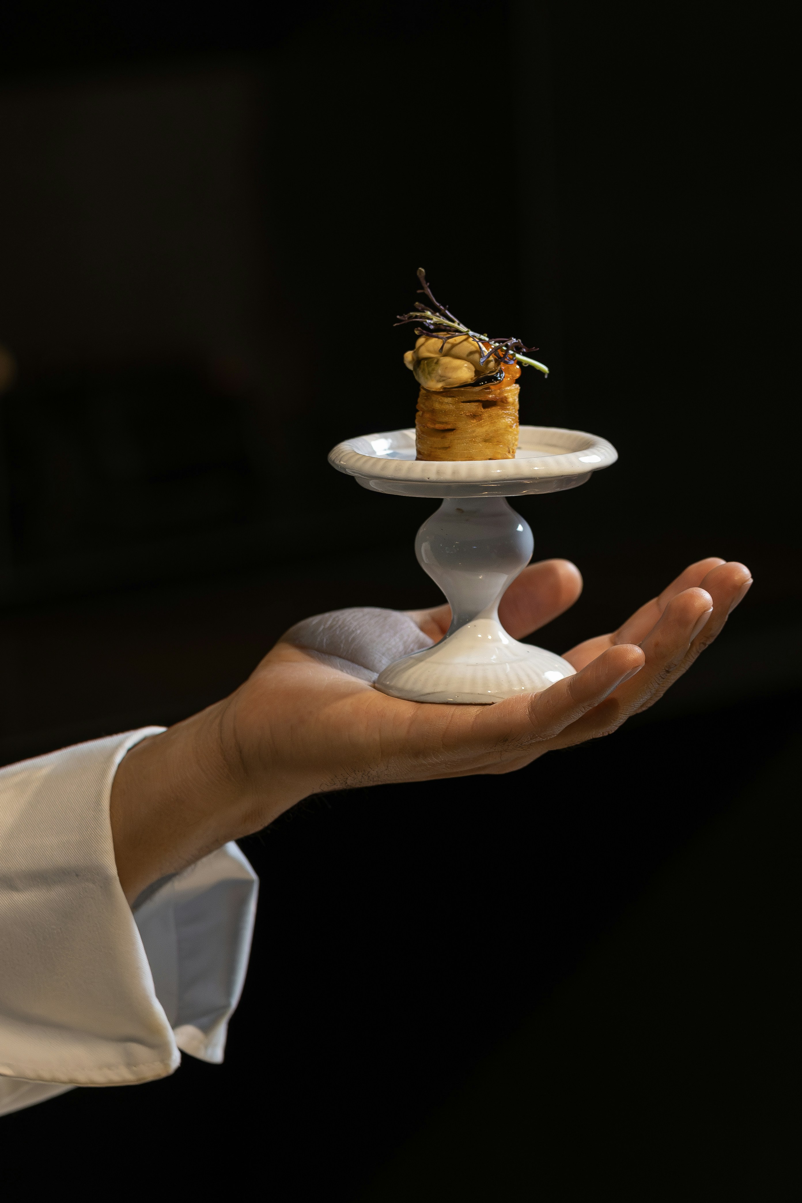 Small Dessert, Big Moment: A Hand-Supported Dessert on a Velvet Stage