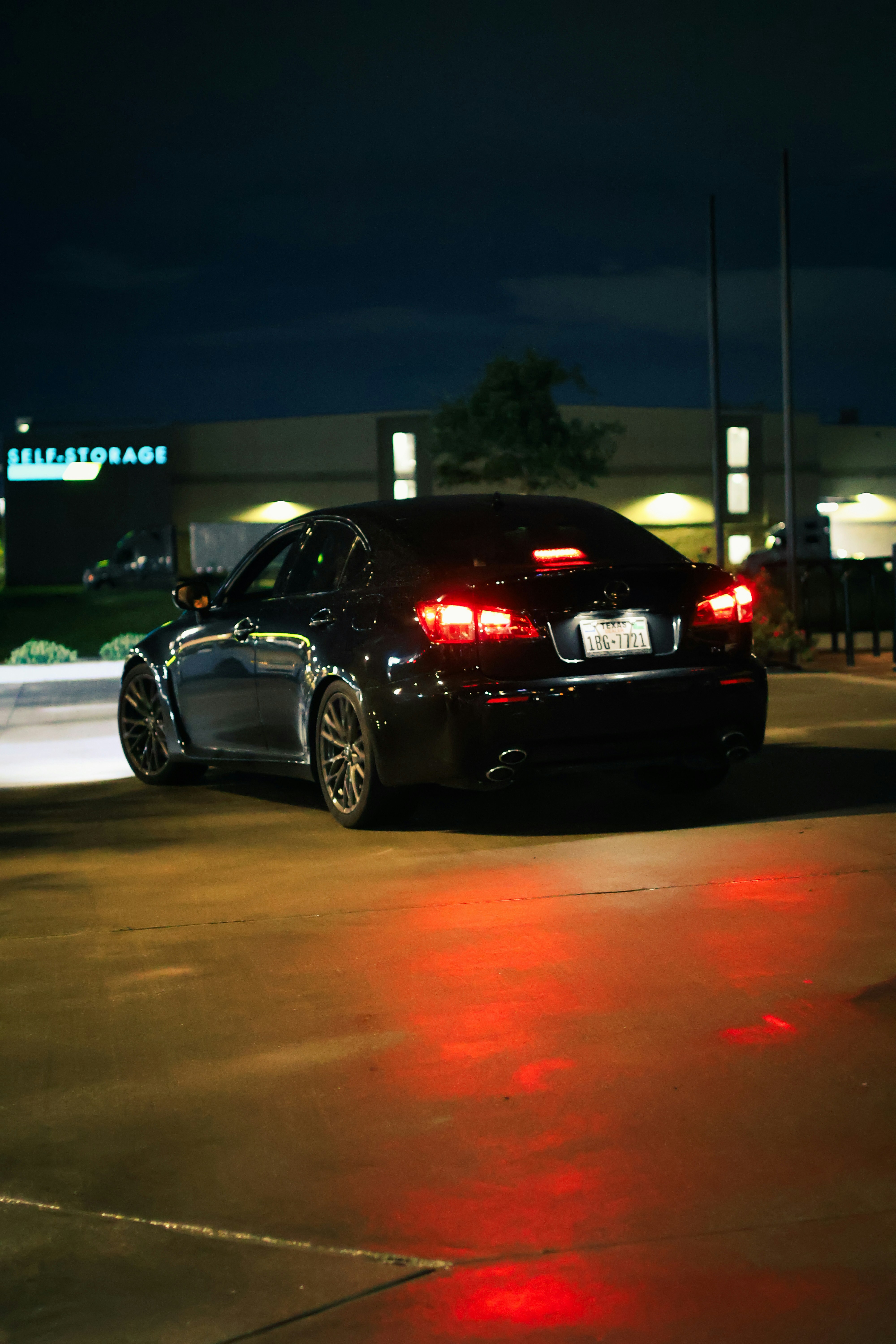 Night Drive: Reflections and Red Tail Lights