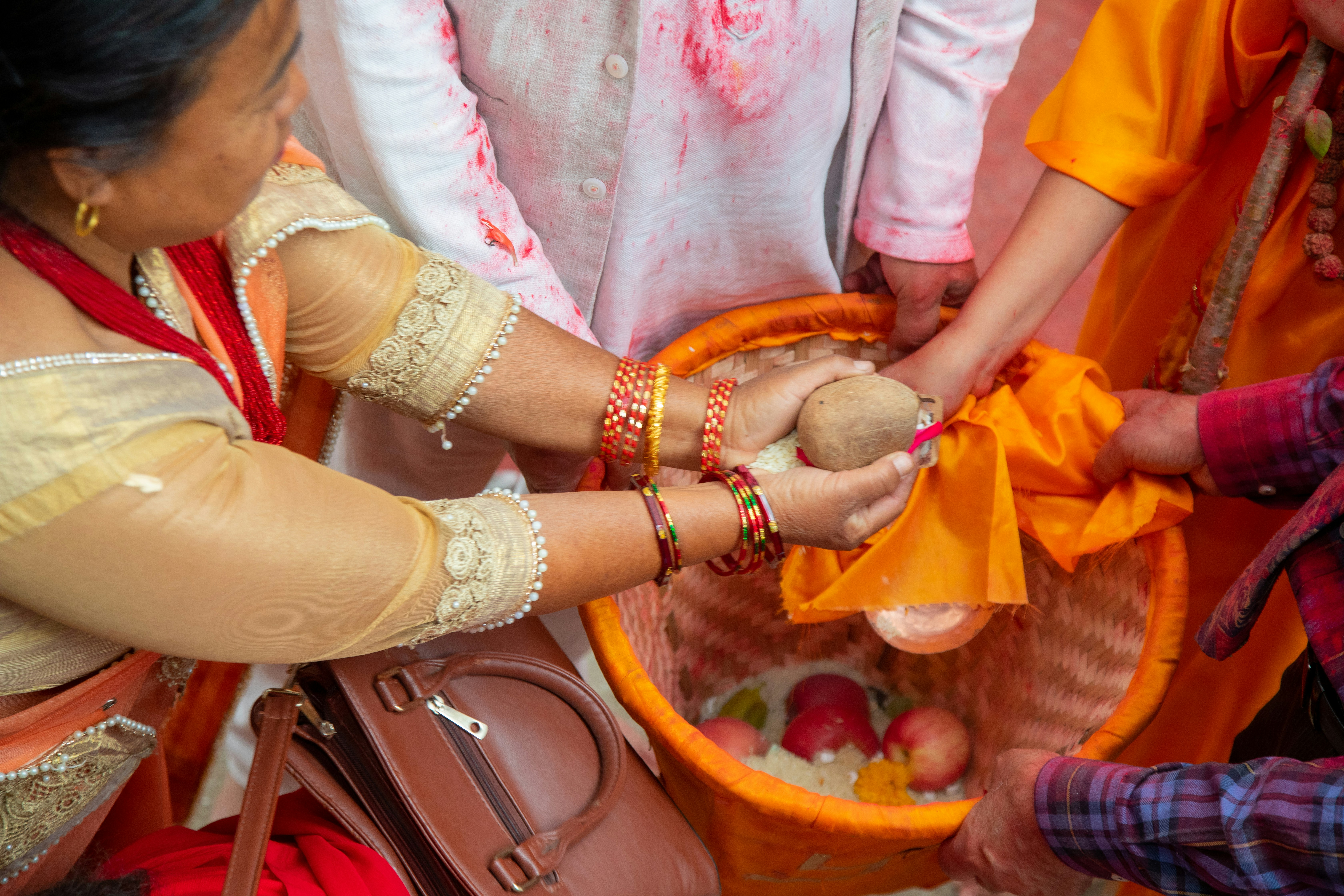 Hands of Tradition: A Hennaed Gesture at a Harvest Ritual
