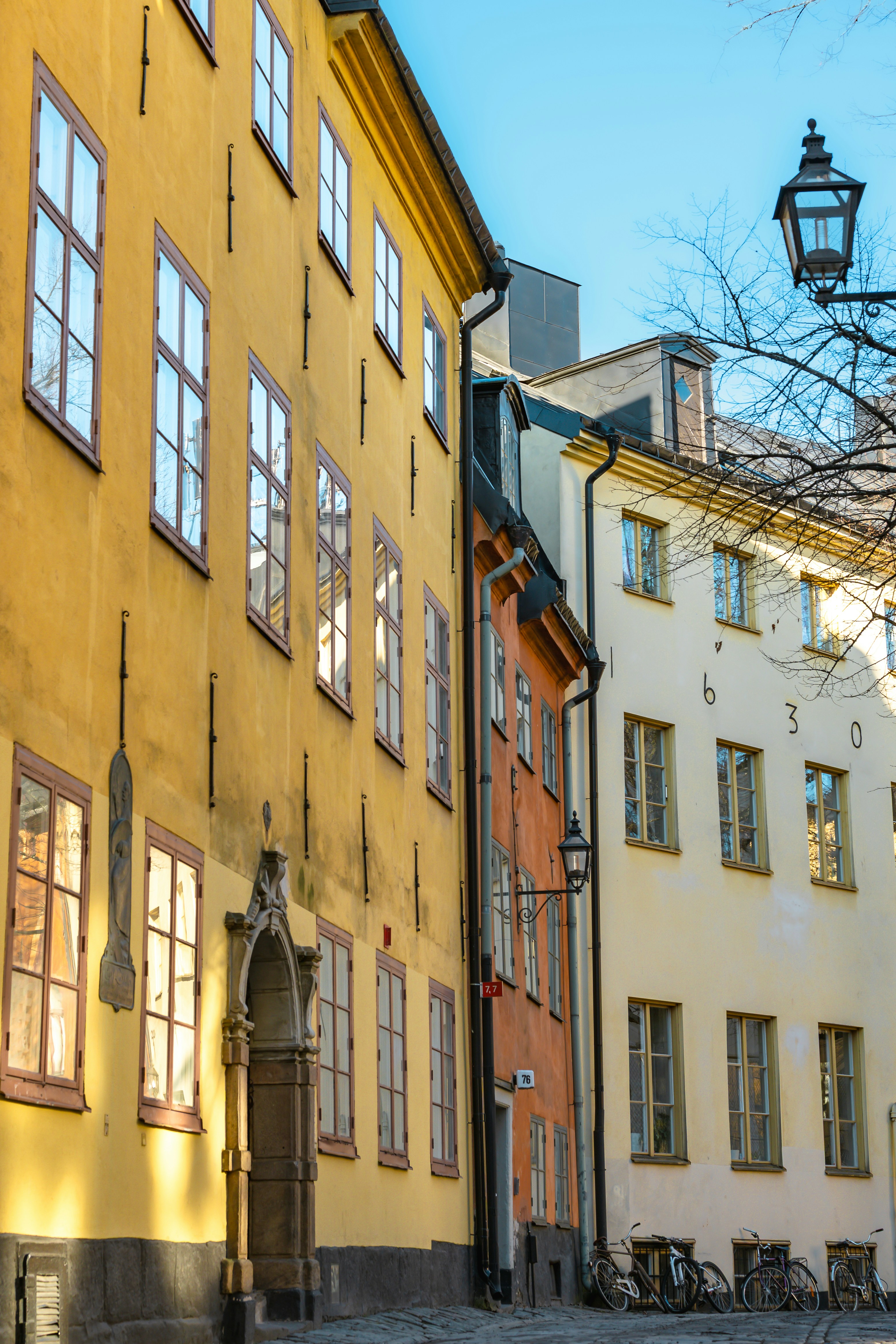 Sunlit Facades on a Narrow European Lane