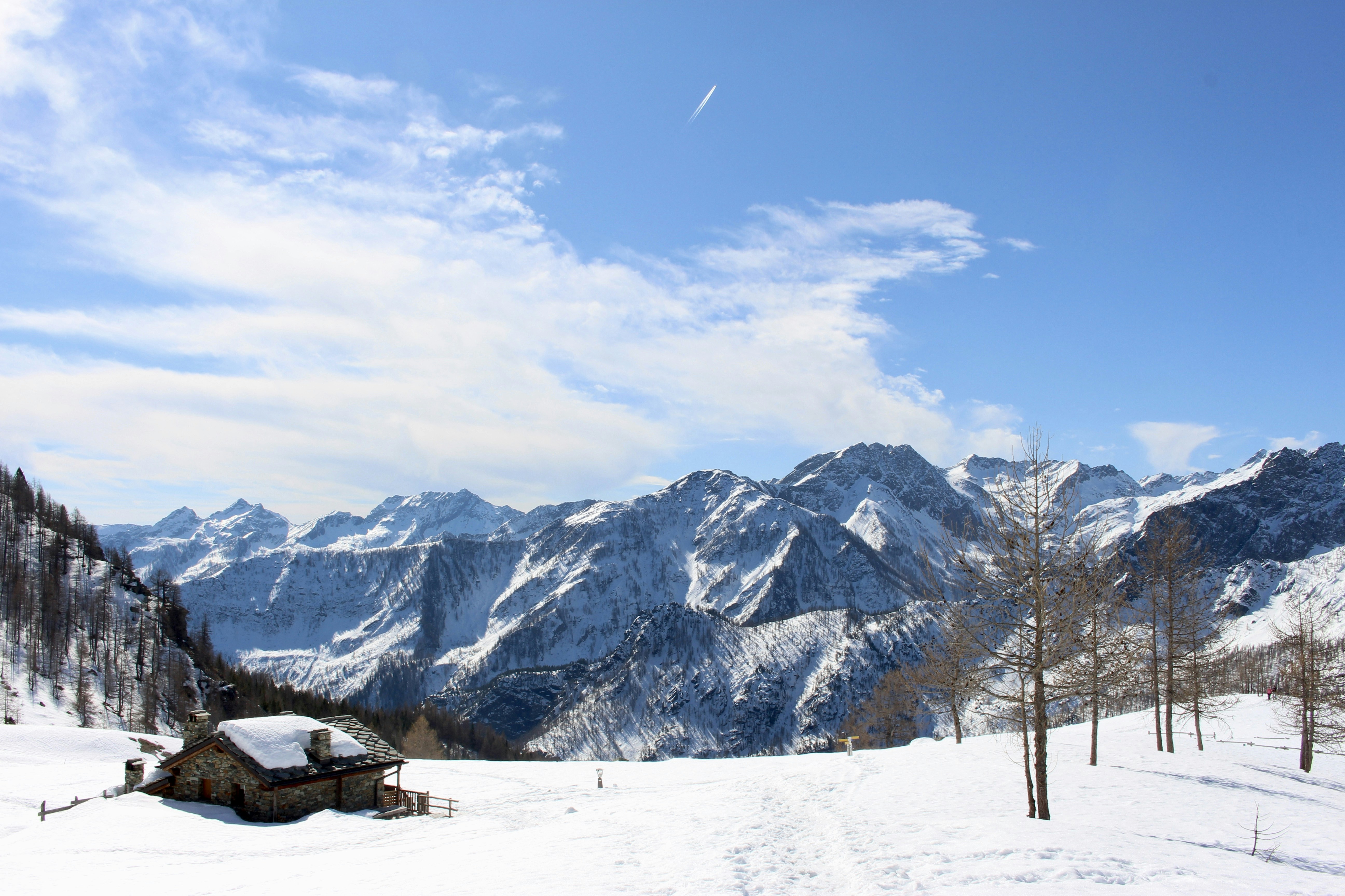 Snowbound Chalet Beneath Alpine Aerials