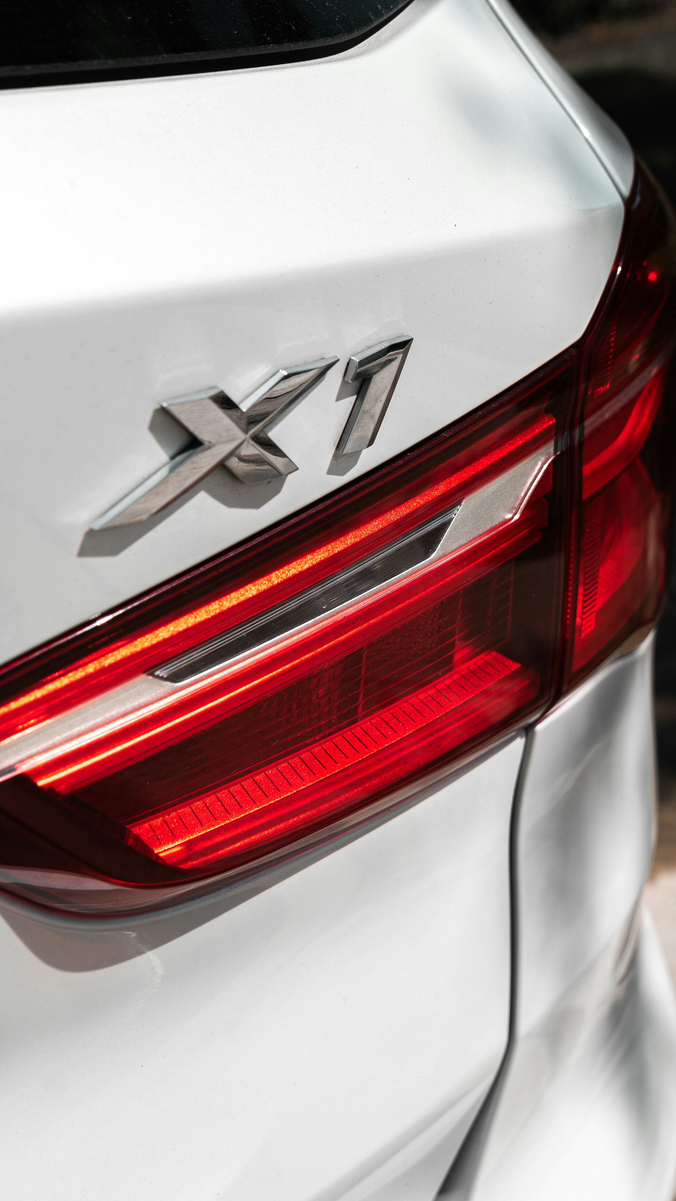 X1 Emblem and Tail Light: A Modern Car’s Quiet Edge