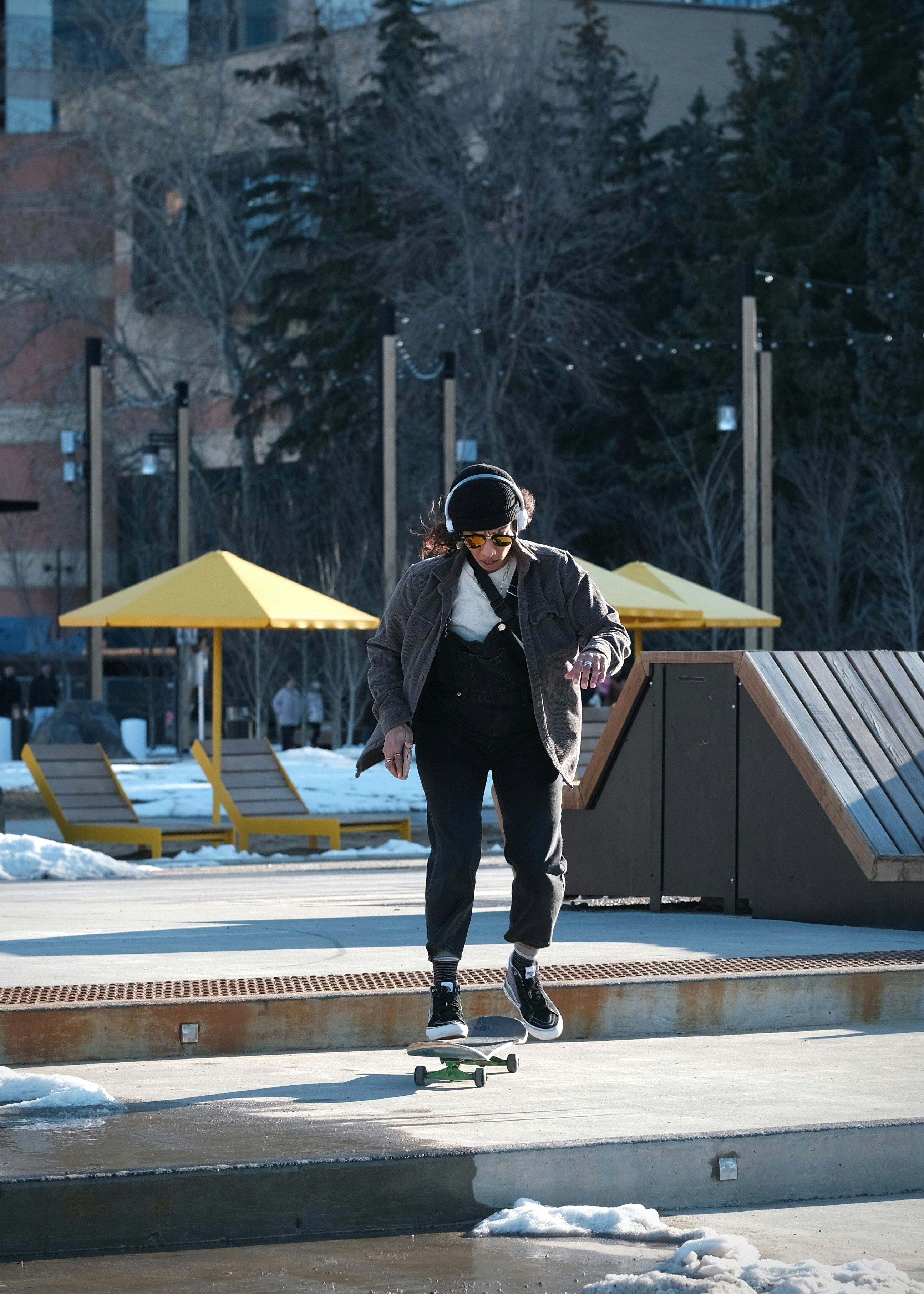 Skater in Winter Courtyard: Balance on a Moving Moment