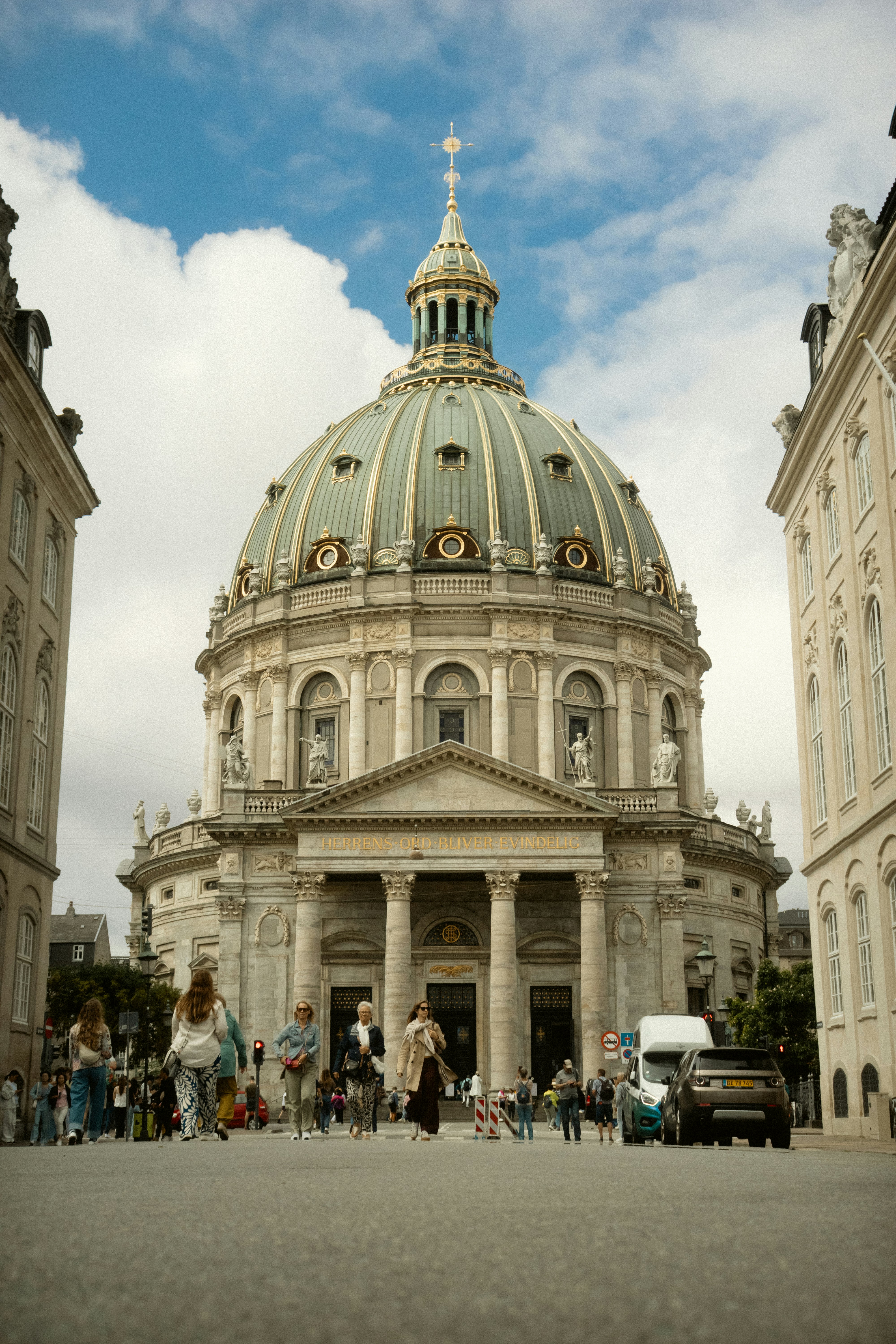 Dome of Central Power: The Grand Baroque Cathedral Framed by Pedestrians