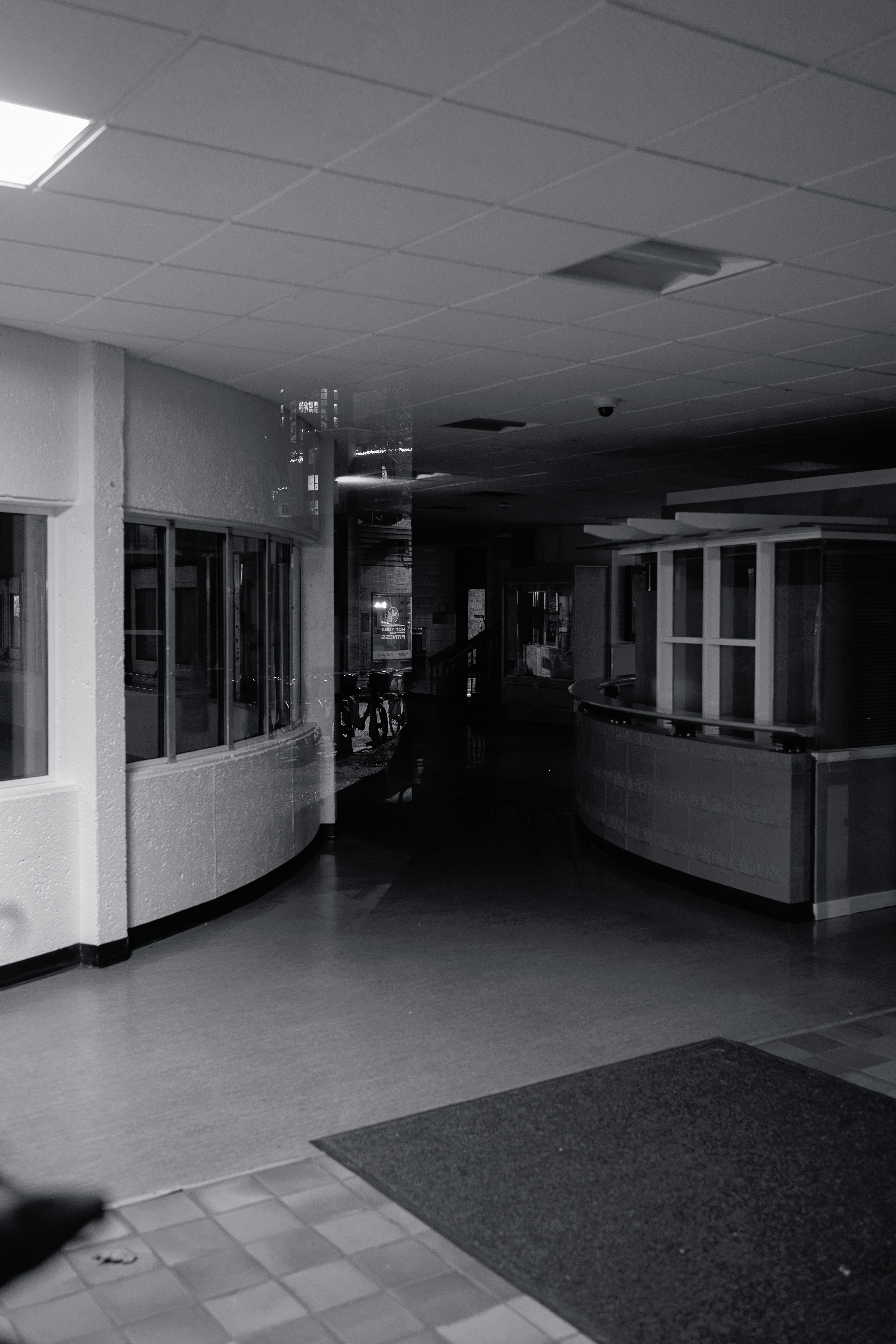 Vacant Lobby Echoes: Neon Reflections in a Silent Corridor