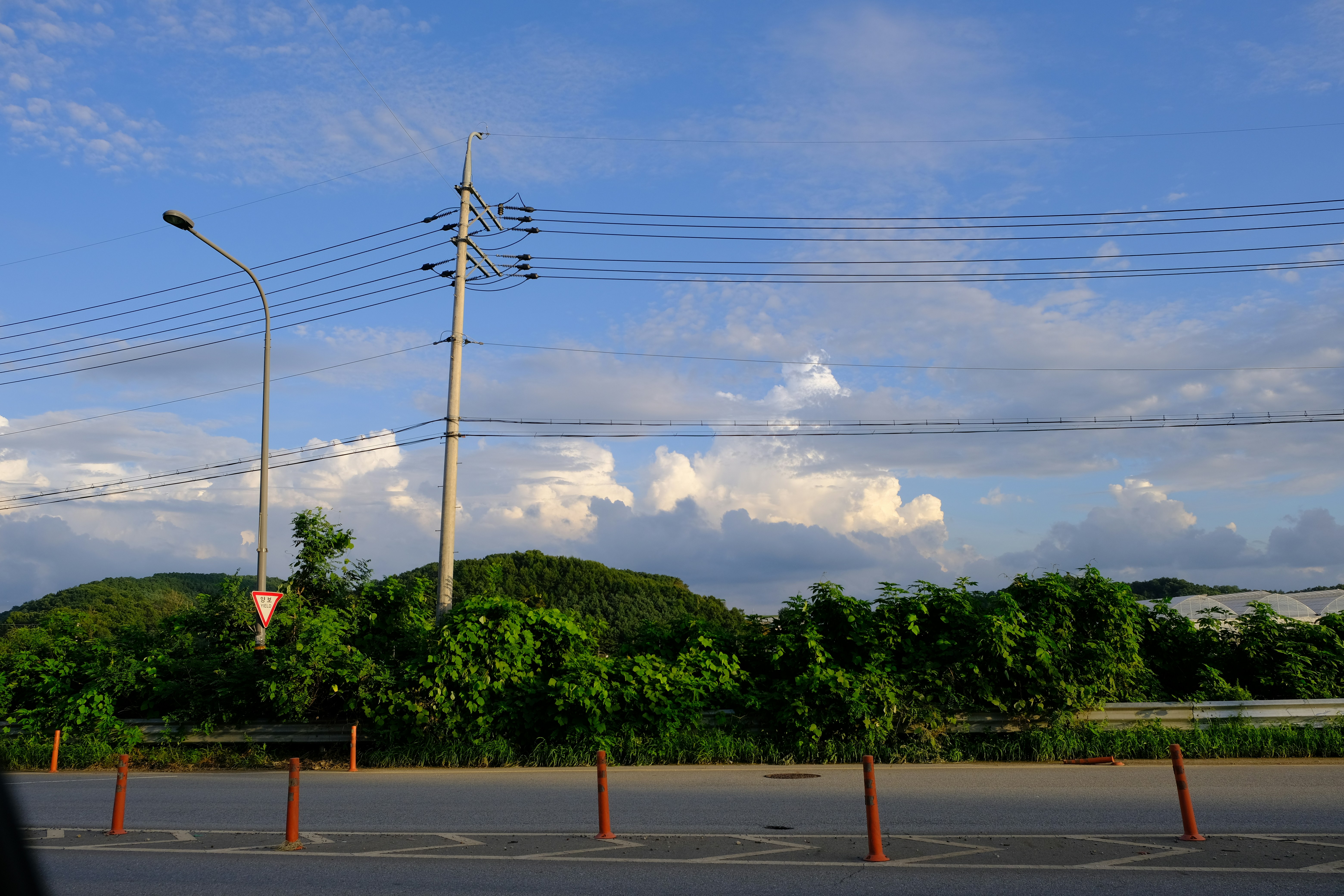 Low Highway Corridor Under a Broad Sky