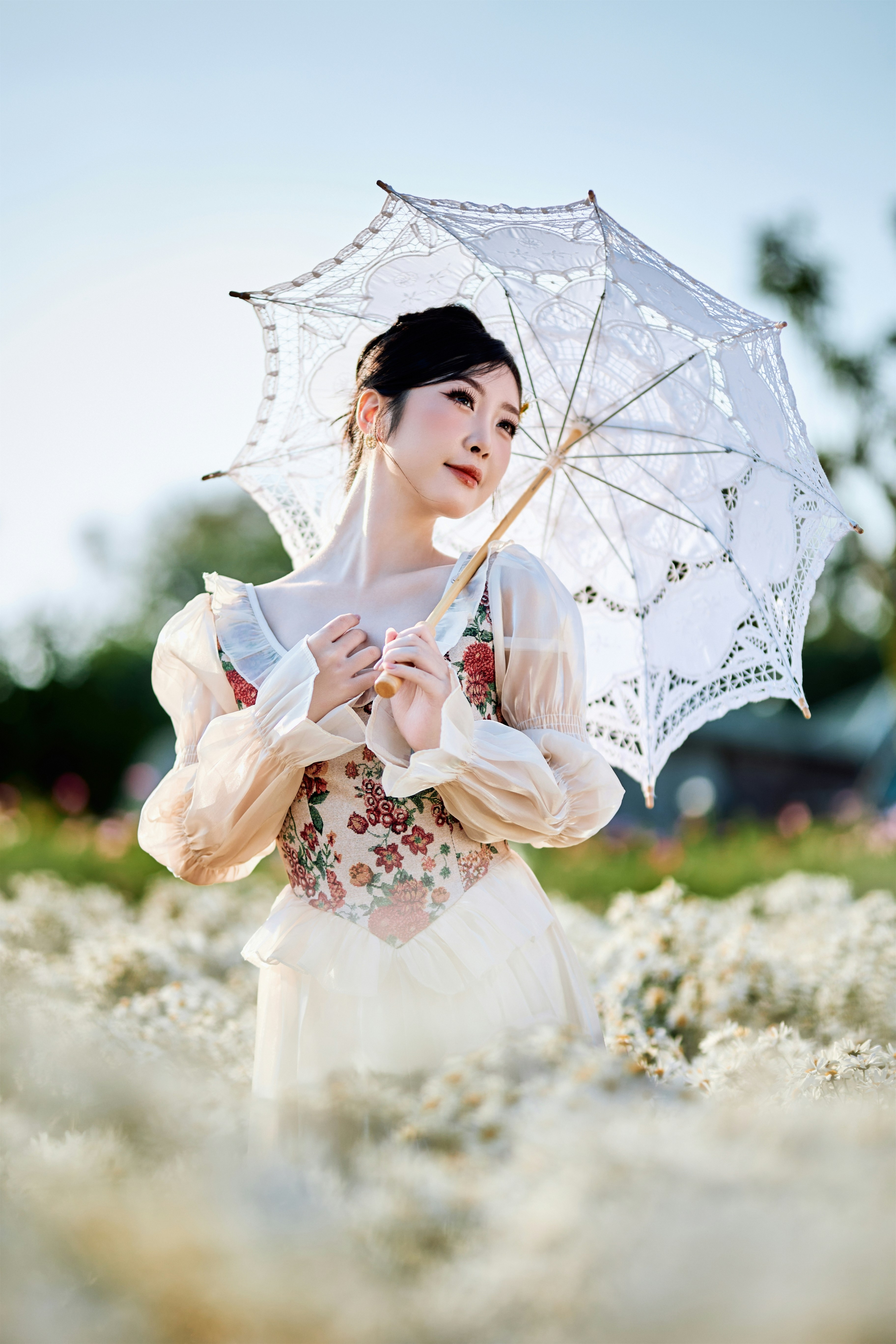 A beautiful girl standing in a chrysanthemum garden under warm sunlight, capturing a soft, dreamy, and elegant moment in nature.