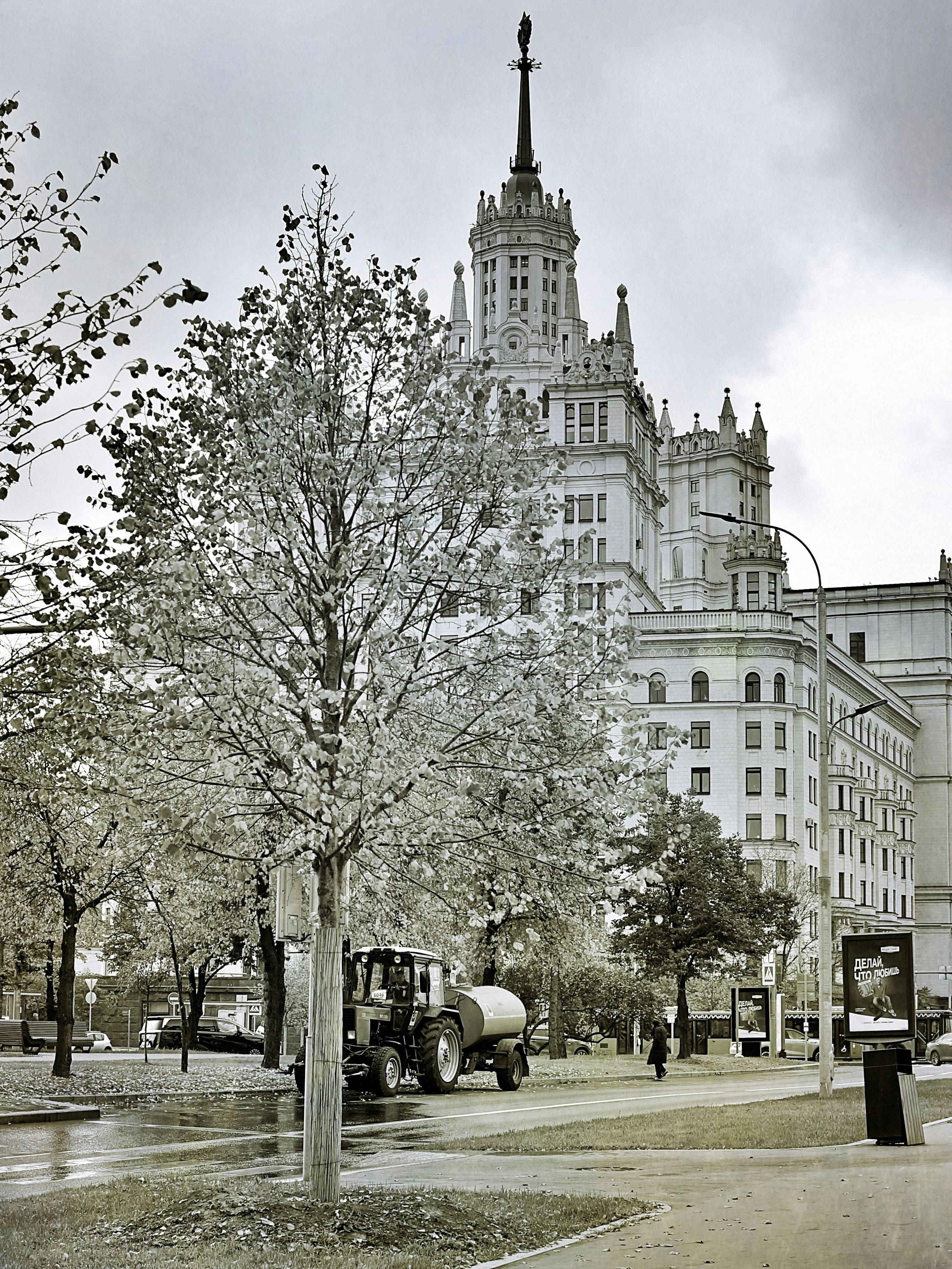 Historic Towered Block Framed by Blossoming Trees