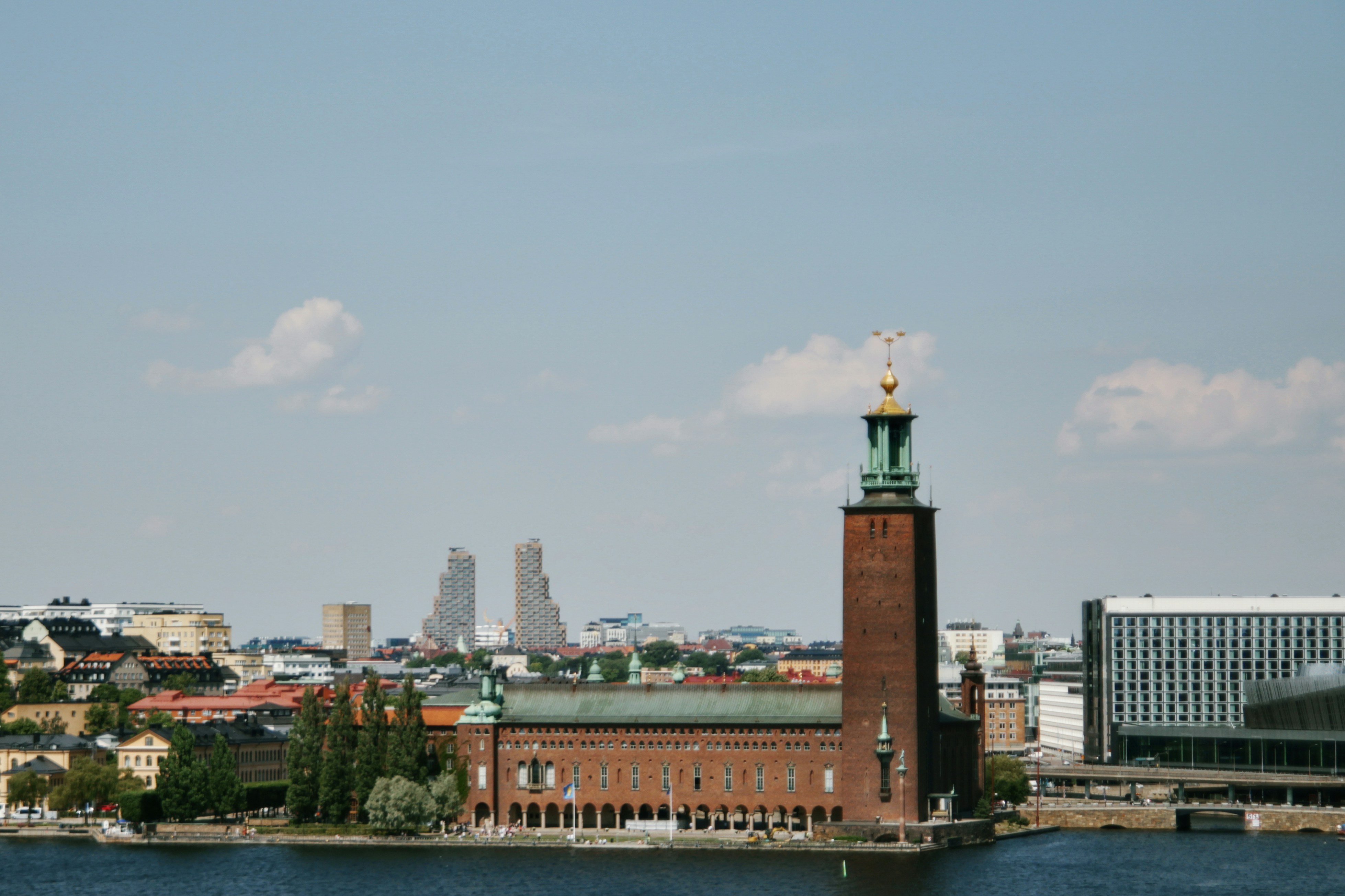 Tower on the Waterfront: A Historic Brick Edifice Rising Over the River