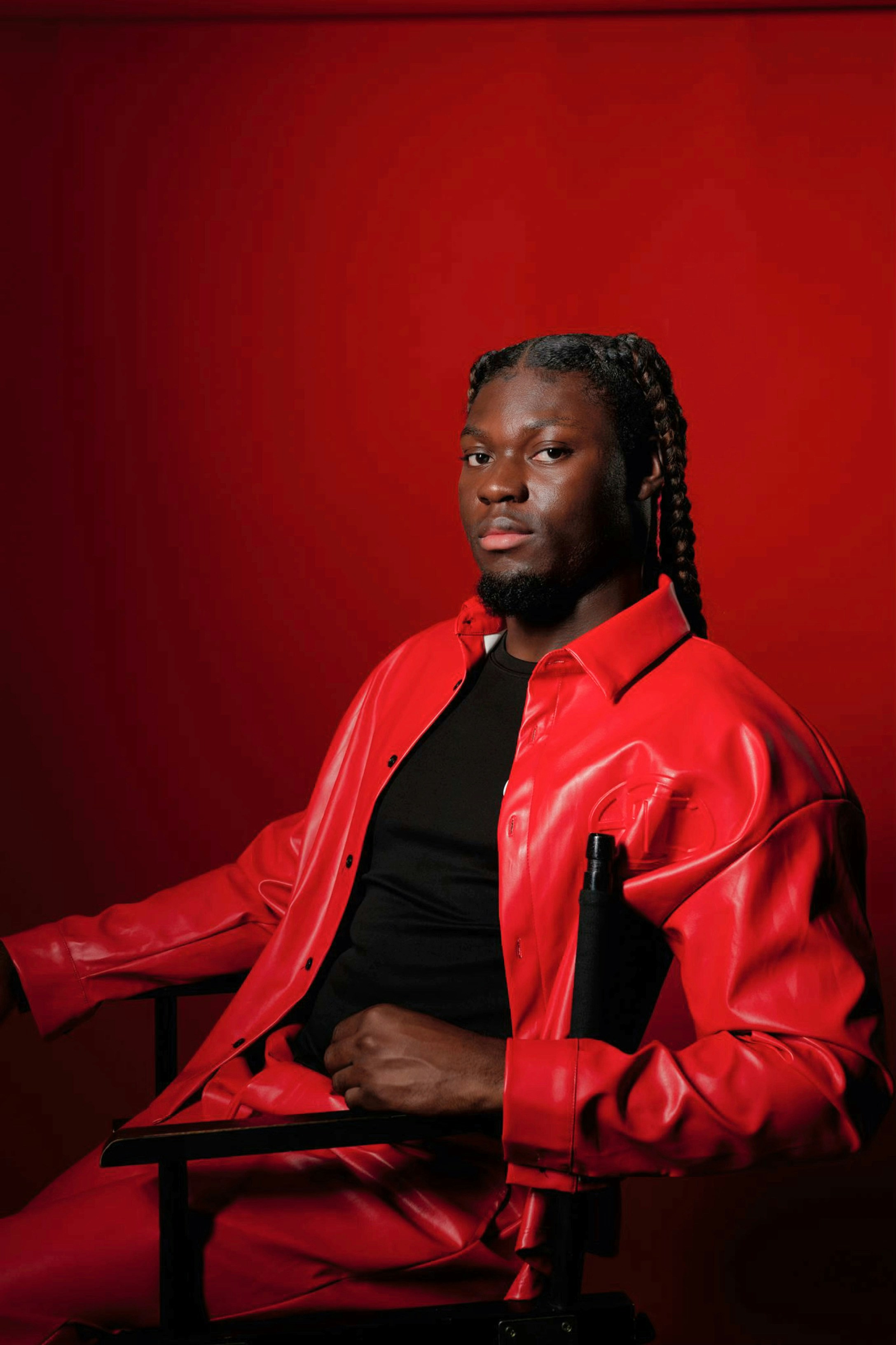Red Threads of Confidence: Portrait in Crimson Leather