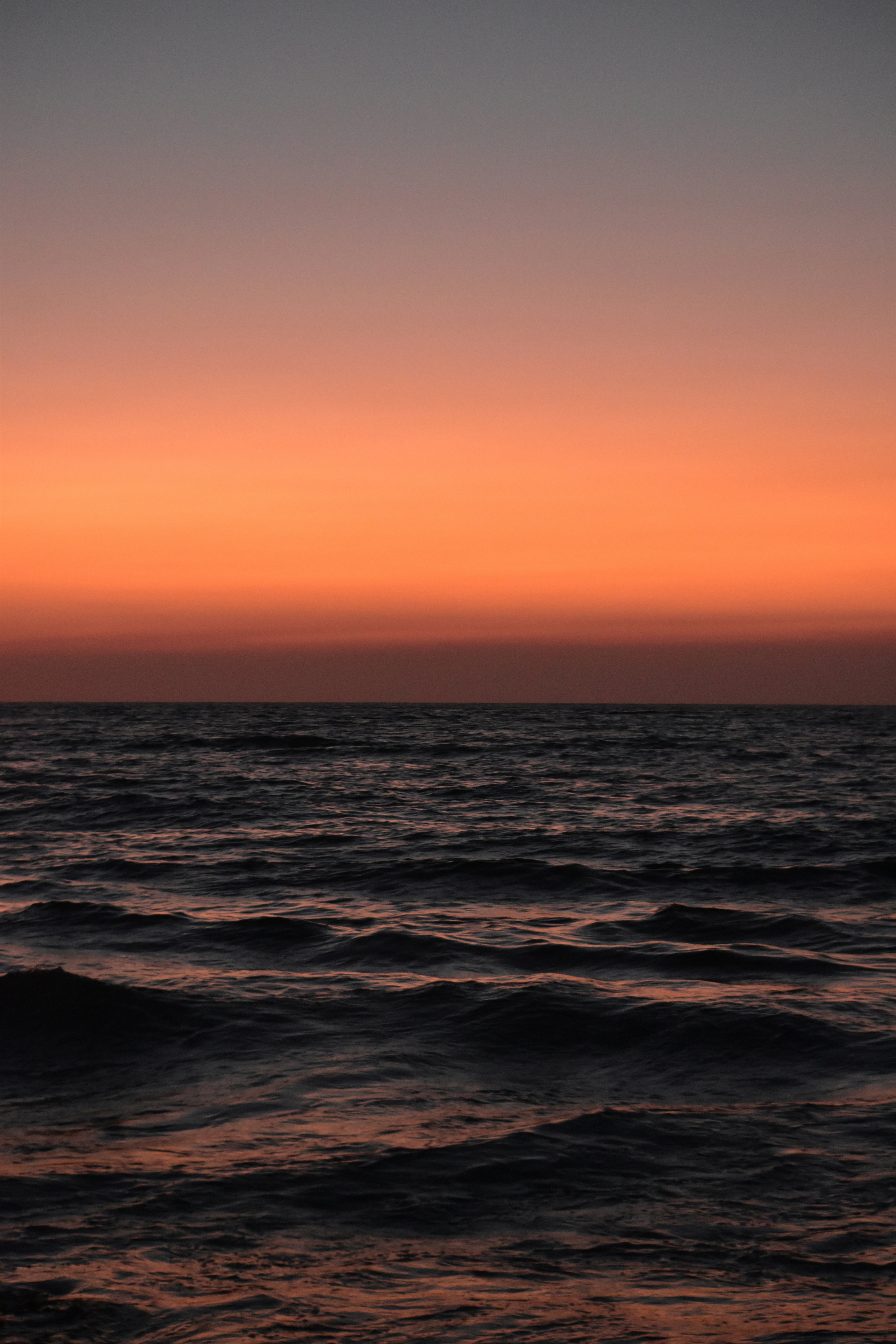 Horizon of Quiet Fire: Ocean at Dusk