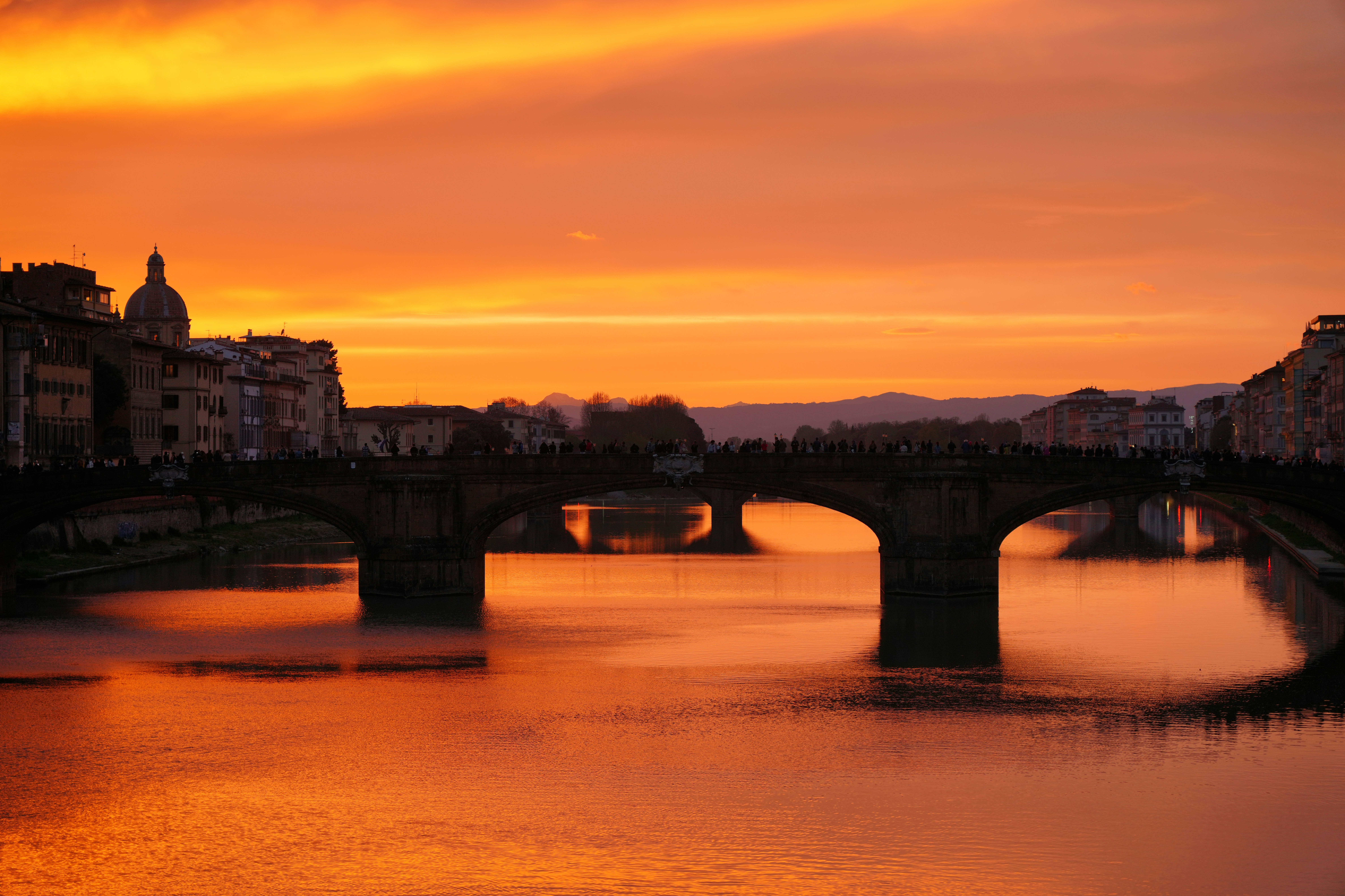 Crimson Evening over the Arched Bridge