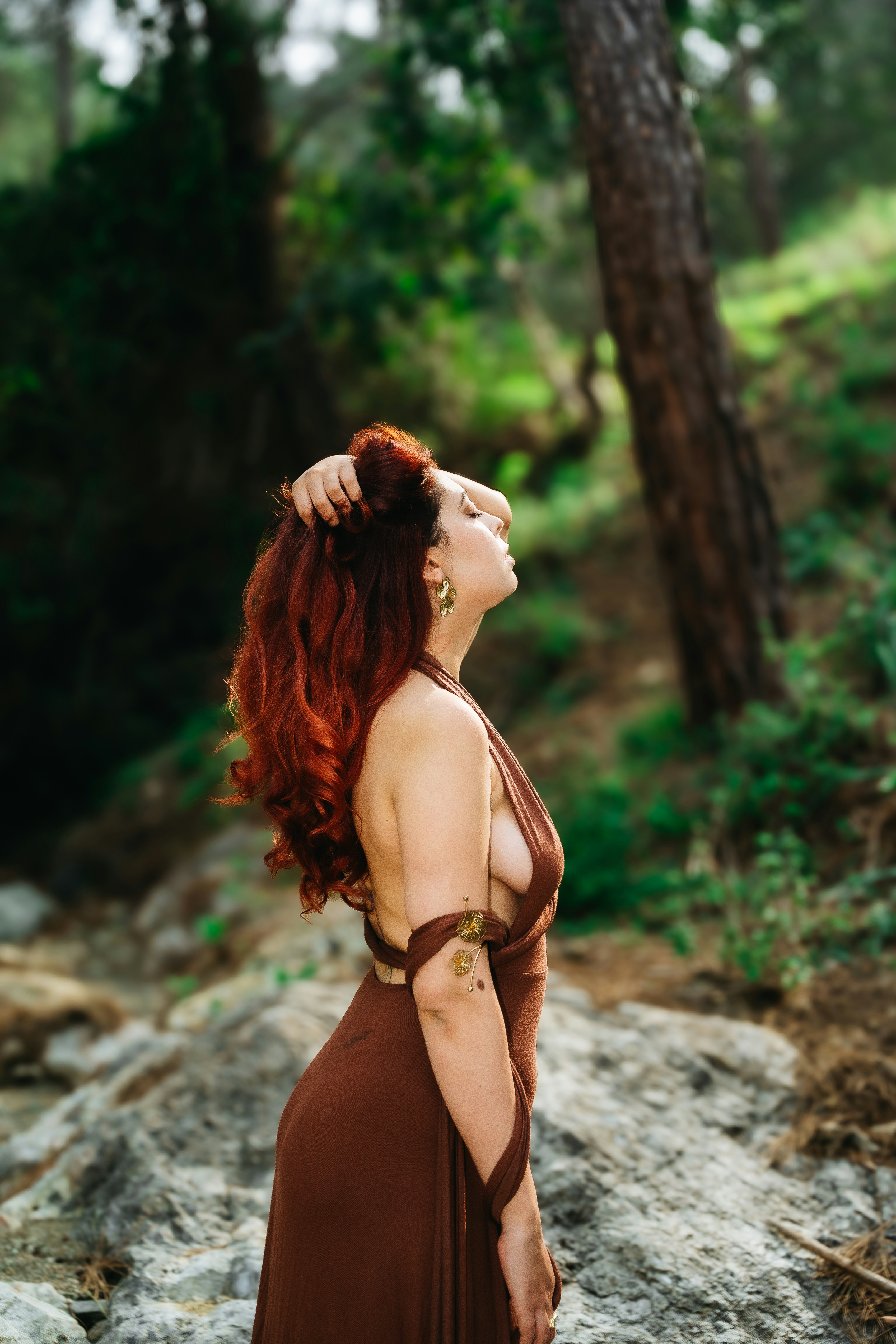 Serene Cypress Gaze: A Red-Haired Muse in Quiet Forest Light