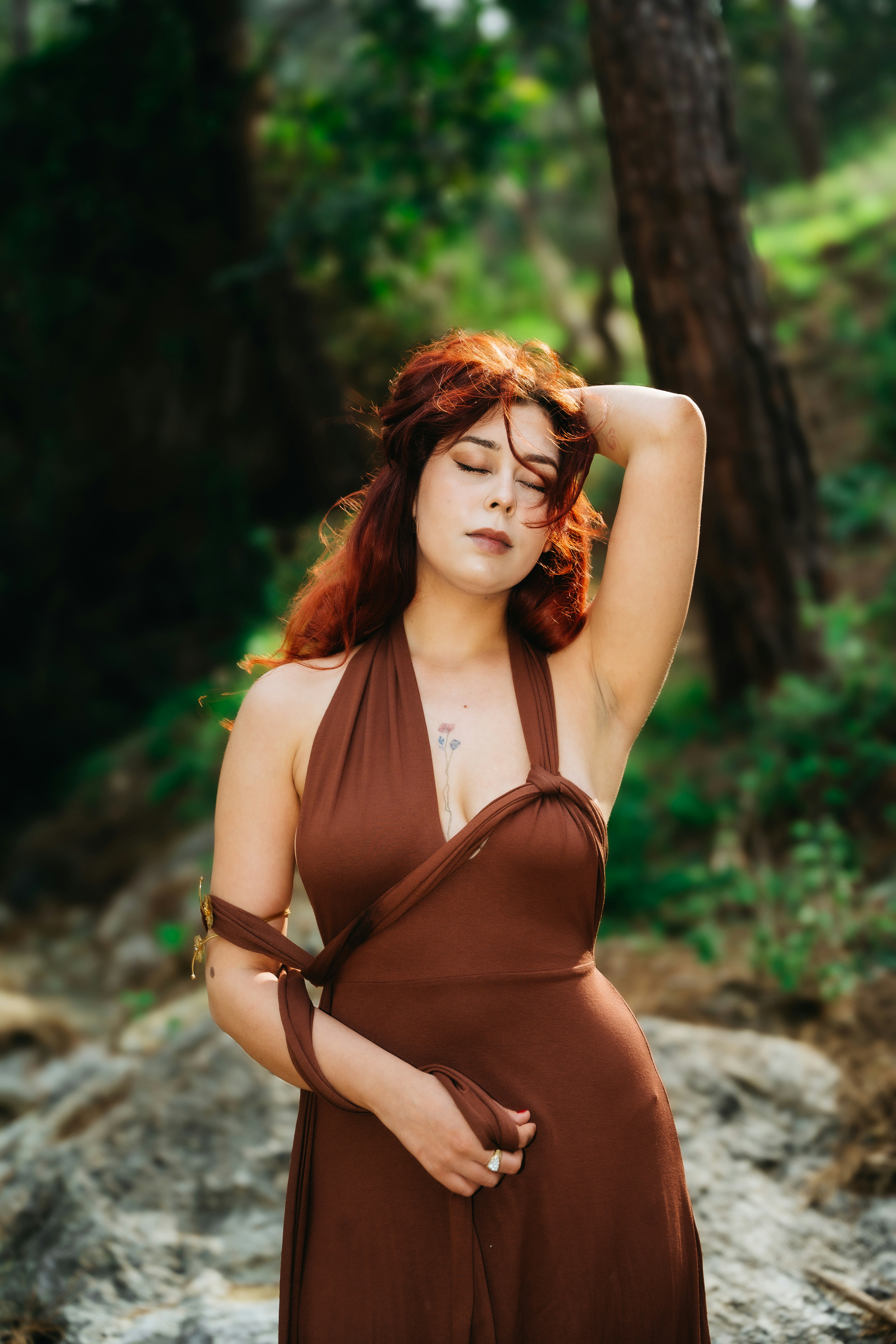 Earth-toned summer reverie: a poised portrait in a sunlit forest