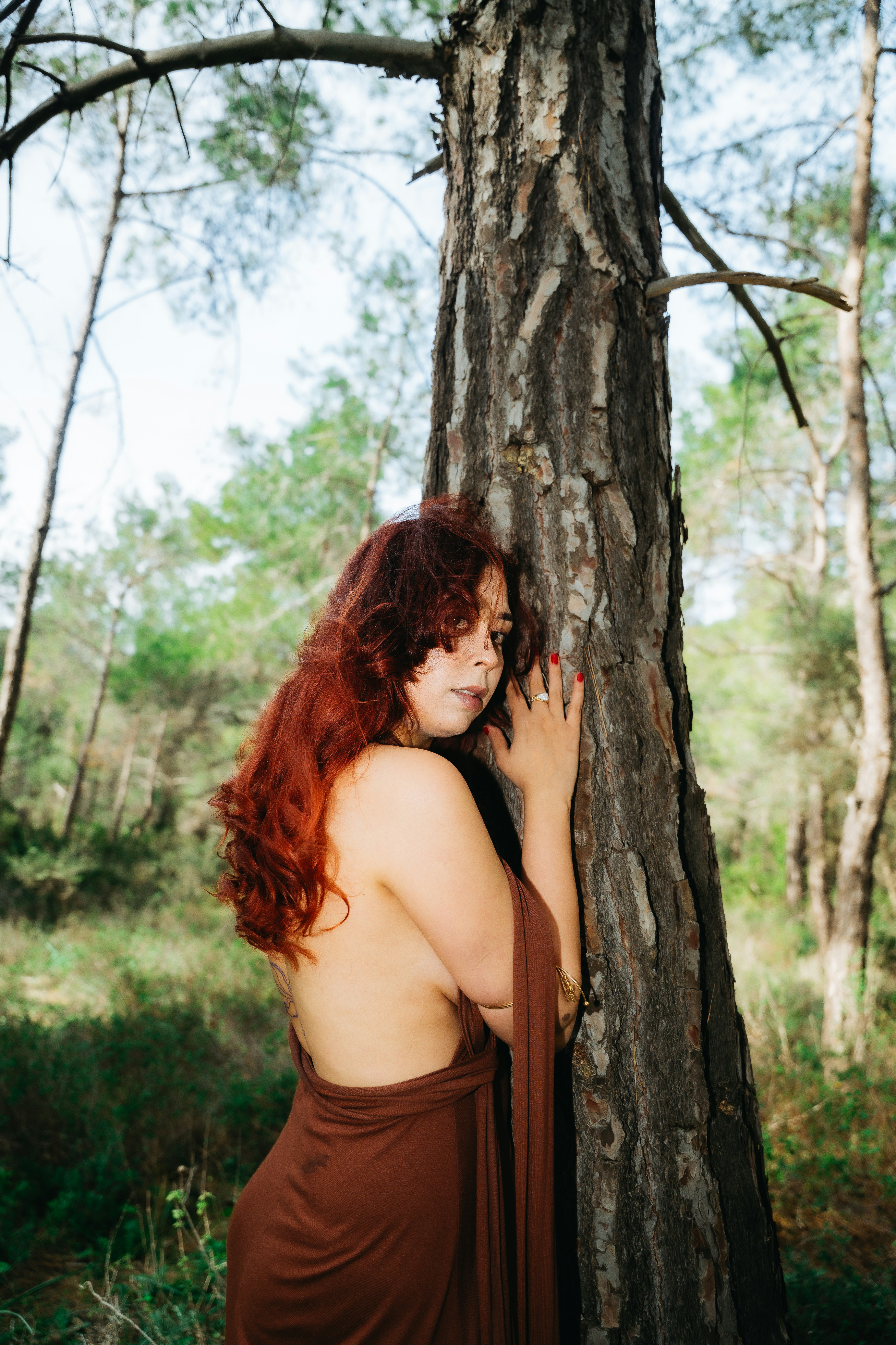 Red-Haired Muse Beside the Bark: A Quiet Forest Embrace