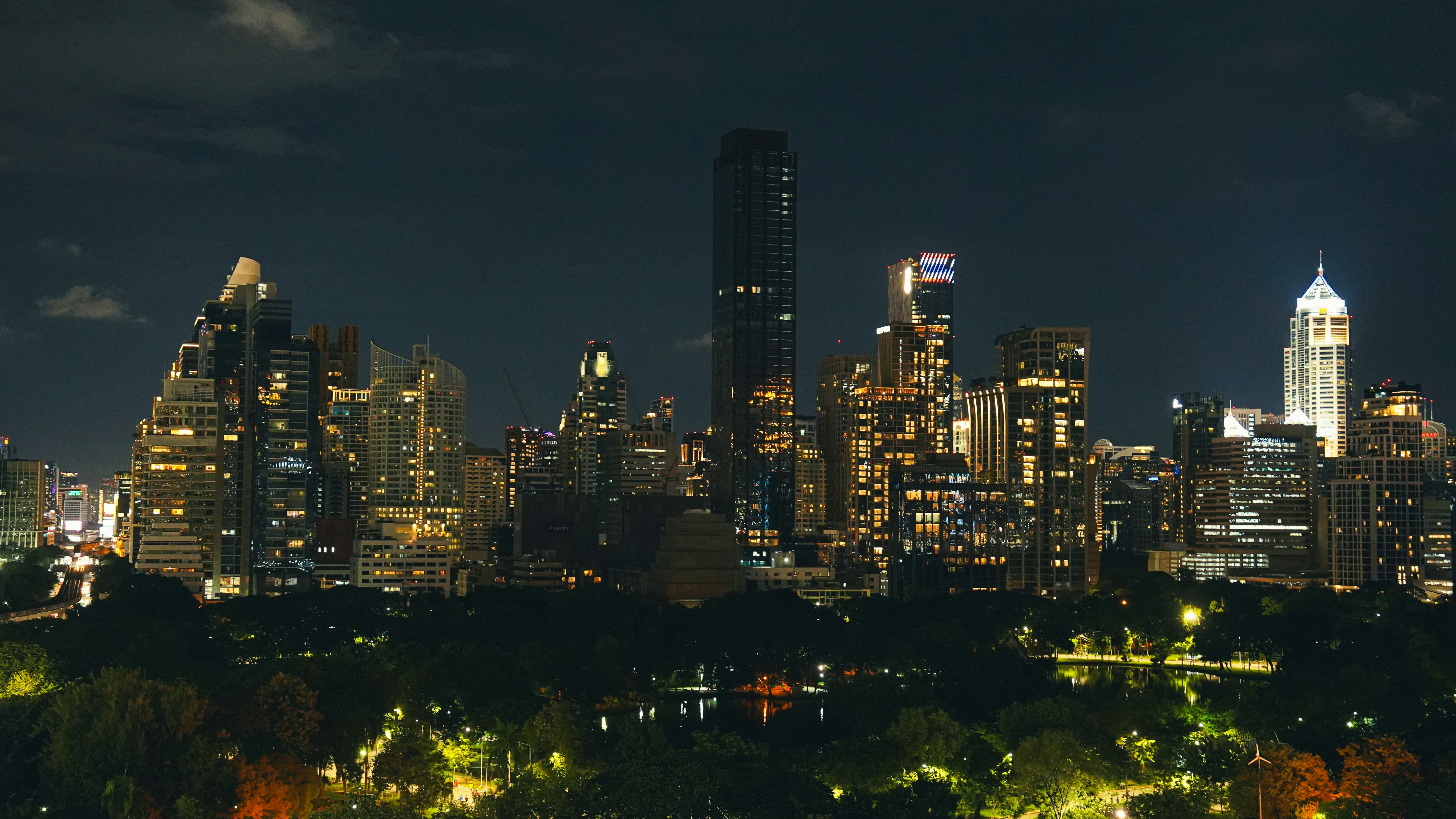 Midnight Metropolis: Skyline Lights Across the Riverside