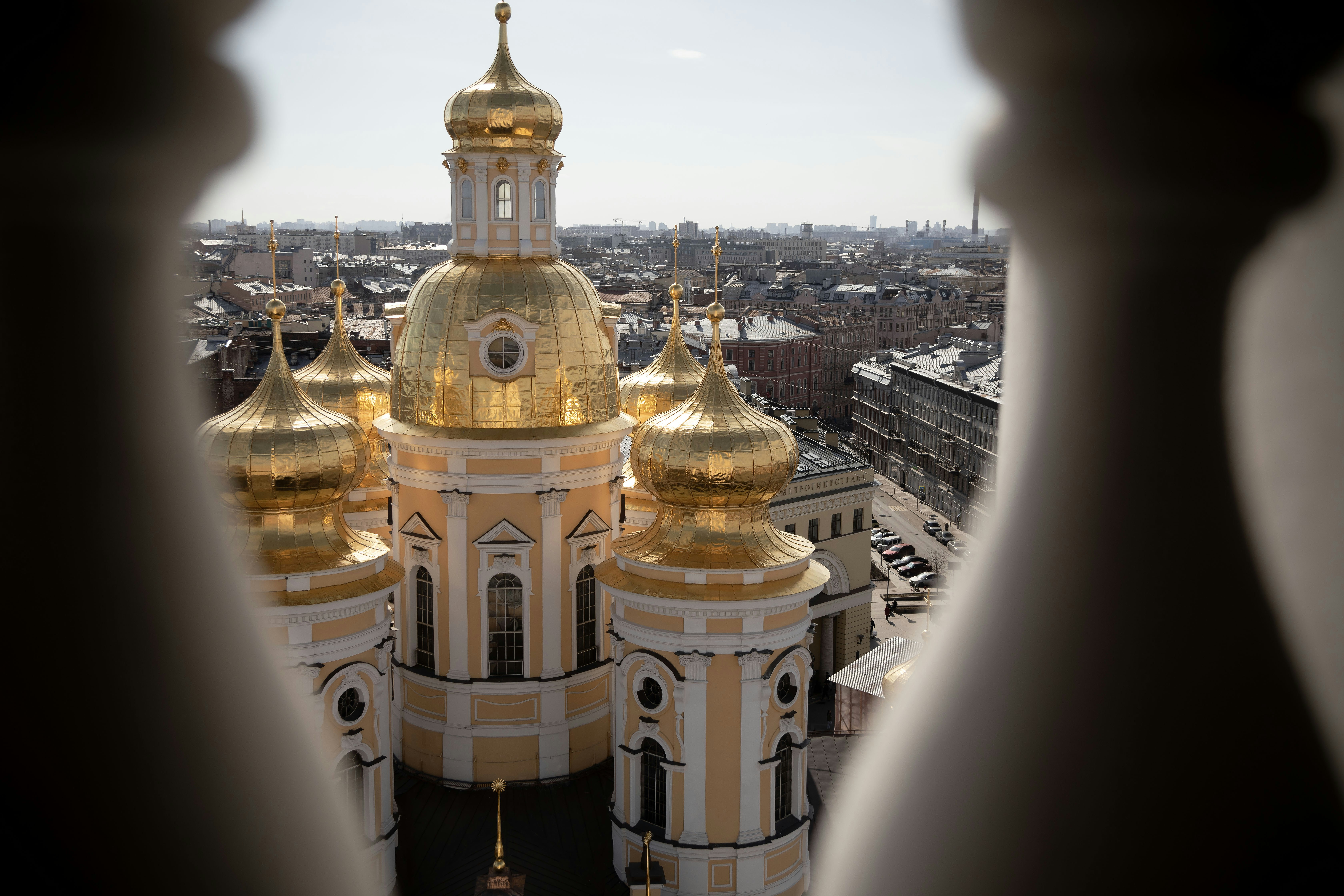Gilded Onion Towers Framed by Architectural Arches