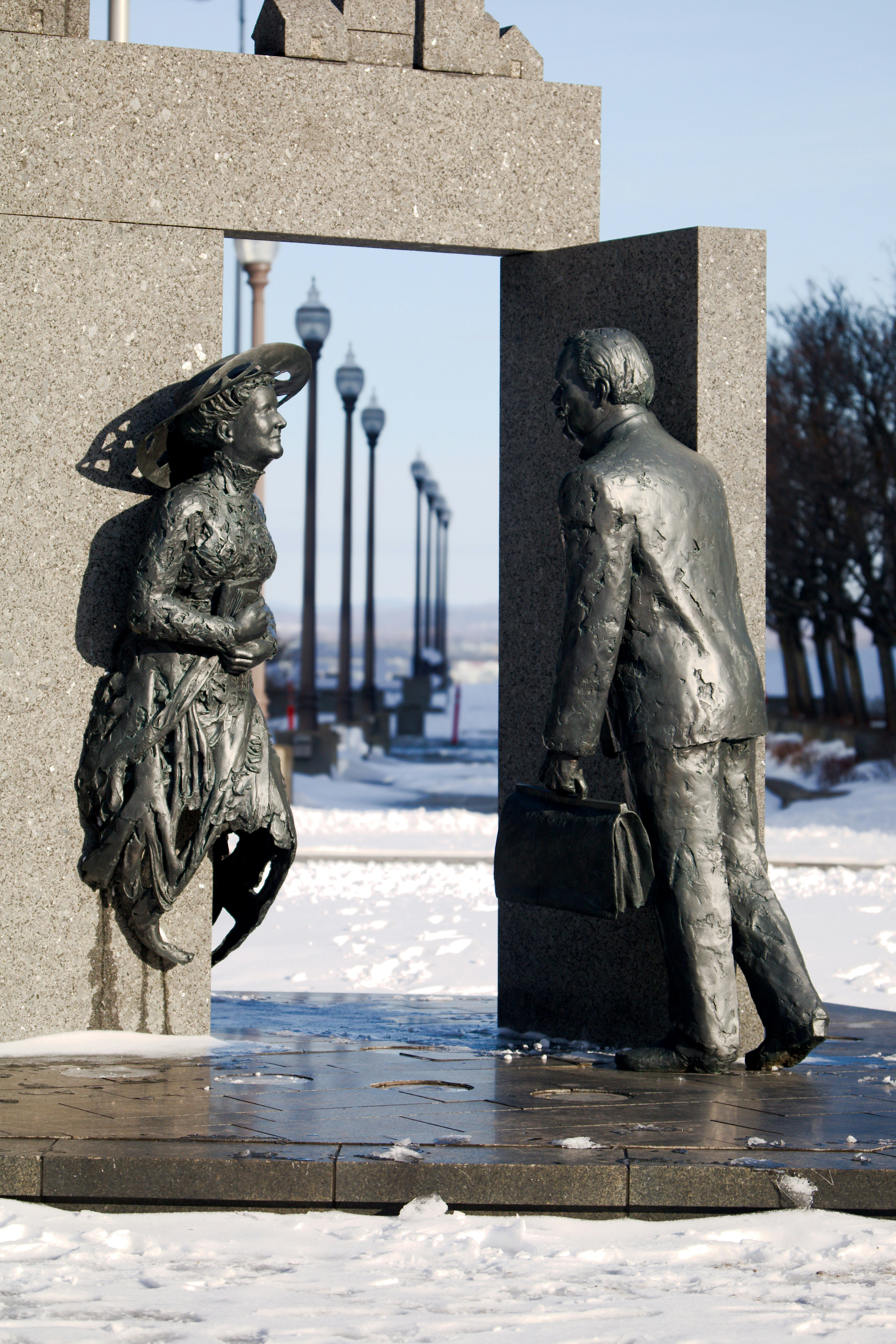 Winter Confrontation: Bronze Figures Framed by Recurring Lanterns