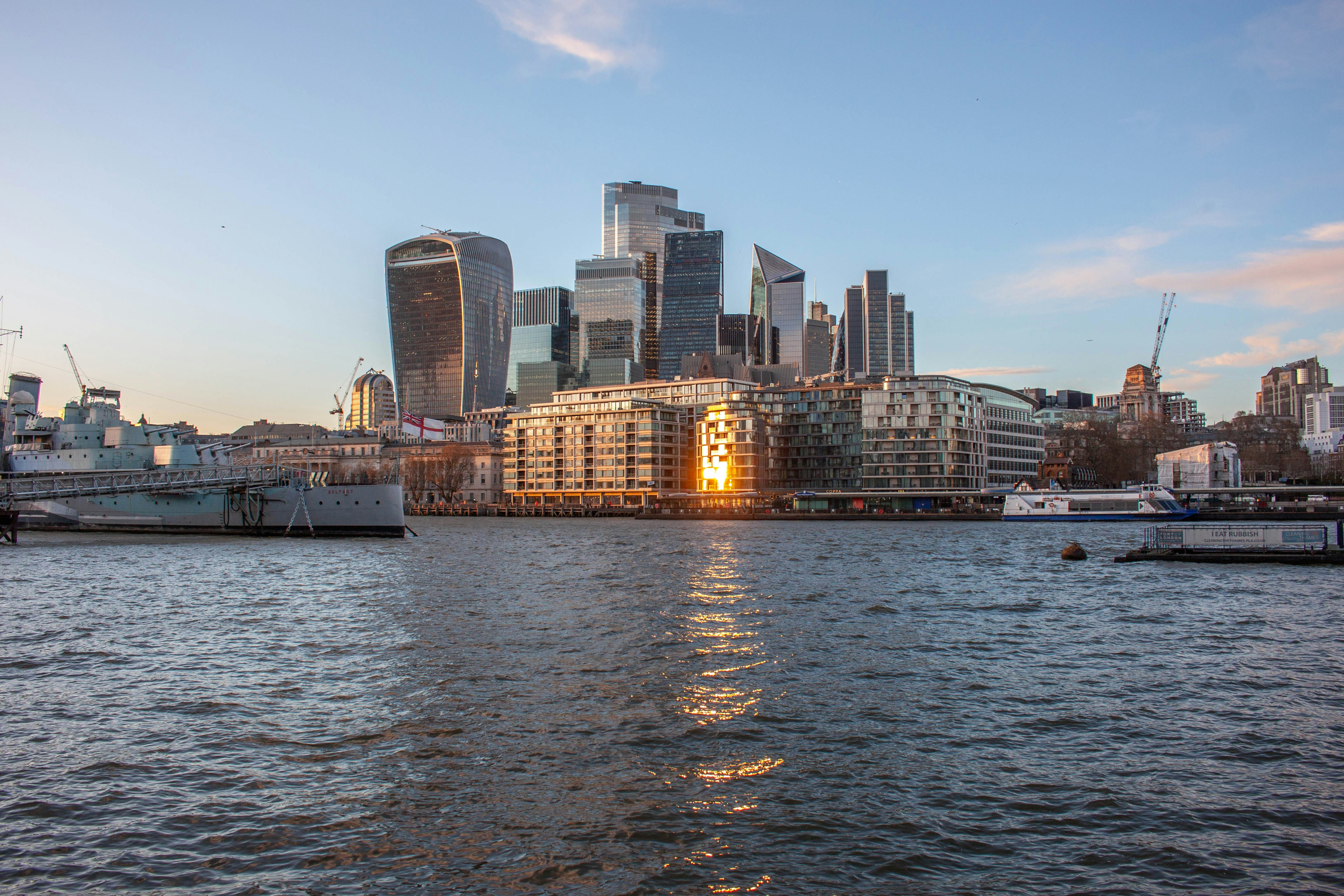 City Skyline and River Reflections at Sunset