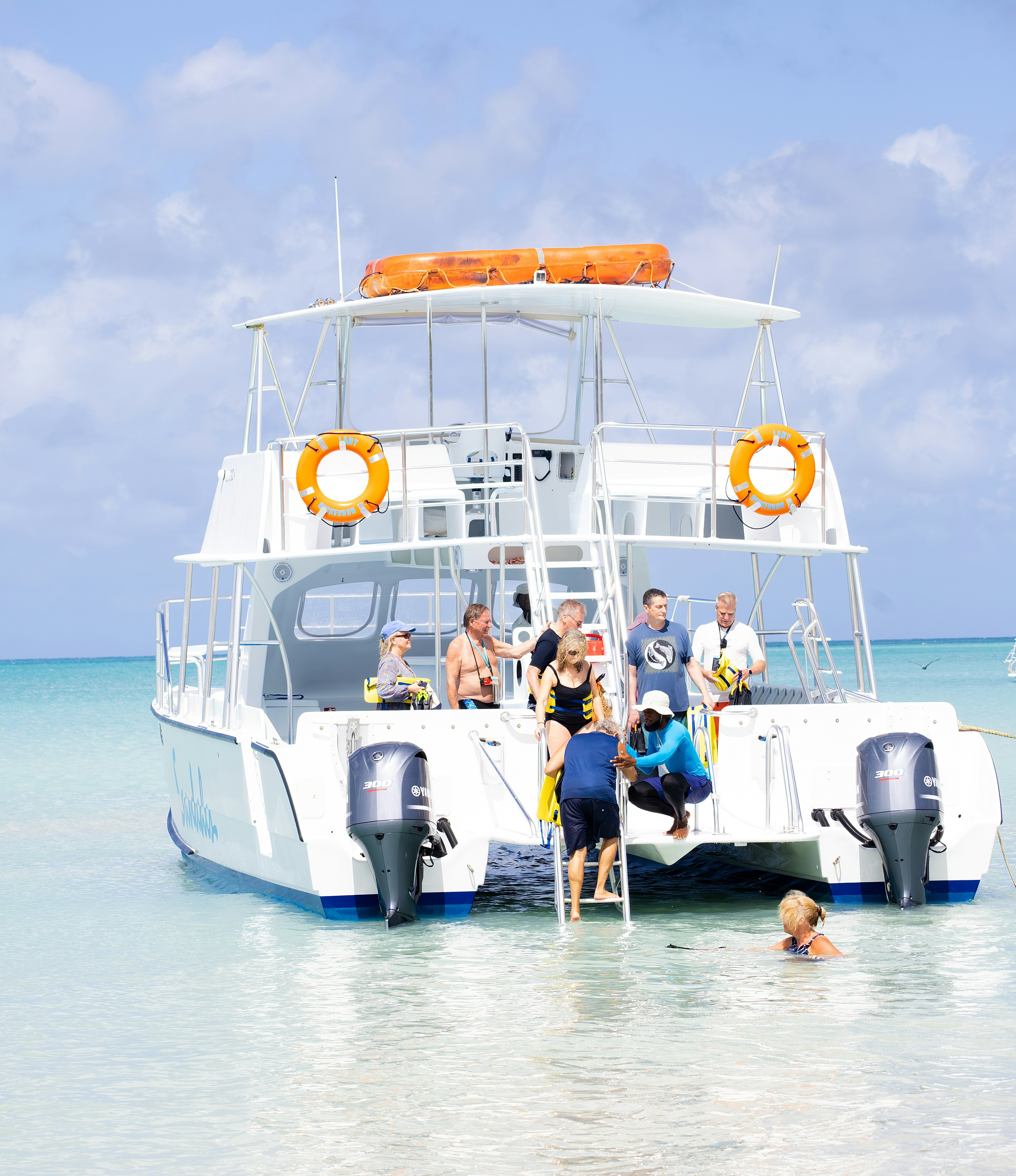 Gathering on the Wake: A Tropical Boat Party at Dusk-Tinted Turquoise Waters