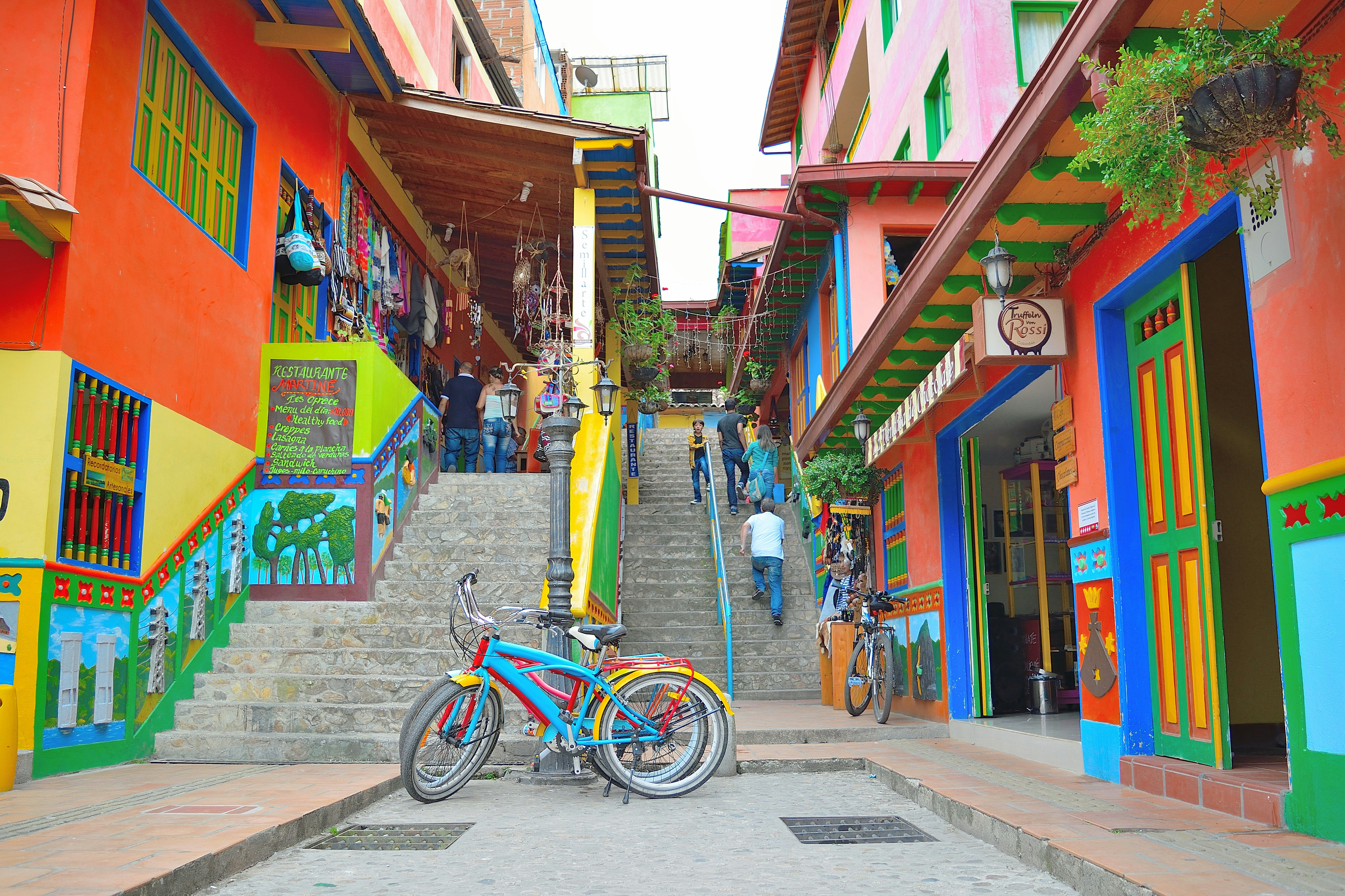 Vivid Callejón: Colorful Steps Toward a Busy Stairway