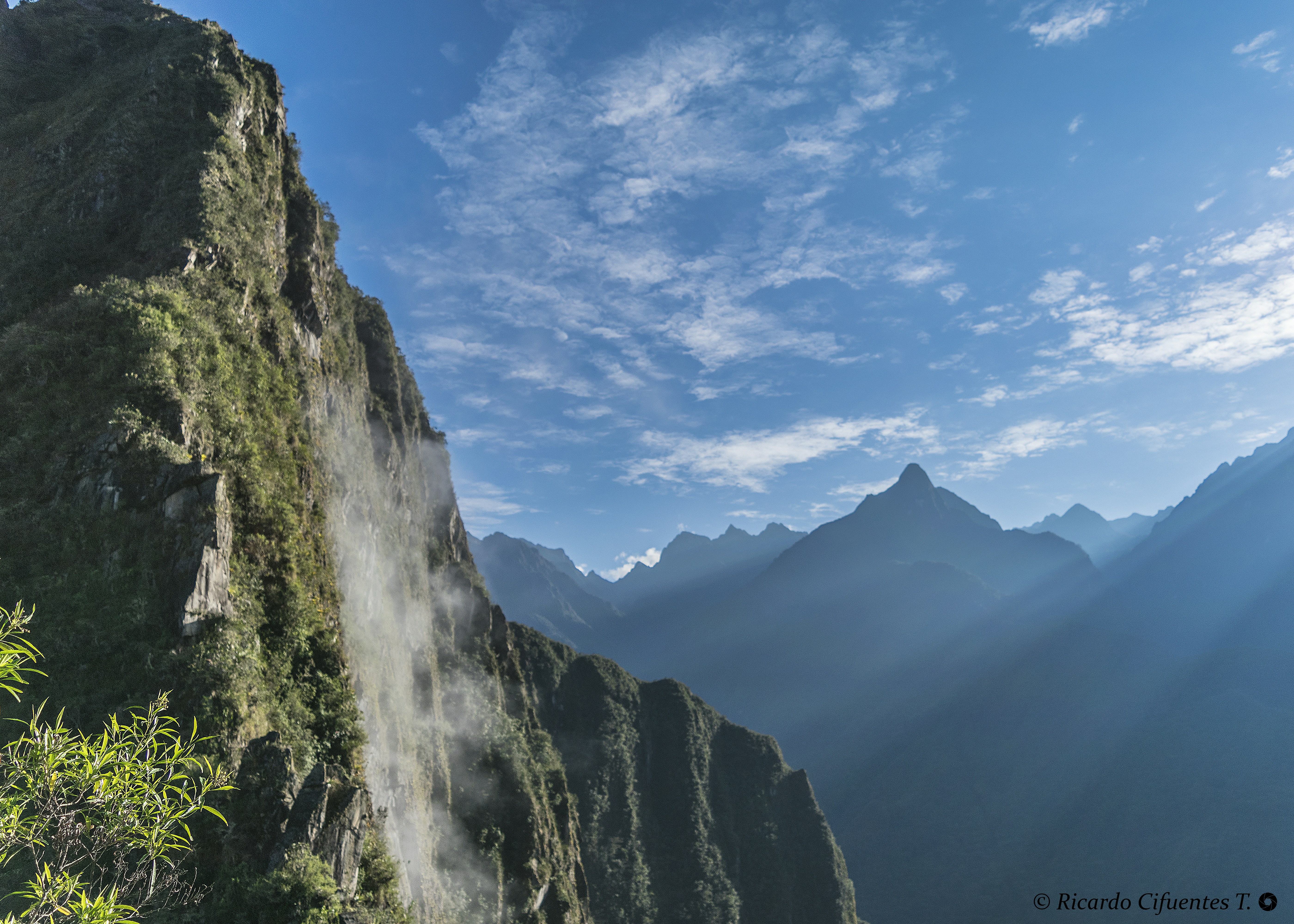 Majestic Cascade Between Twin Ridges at Dusk