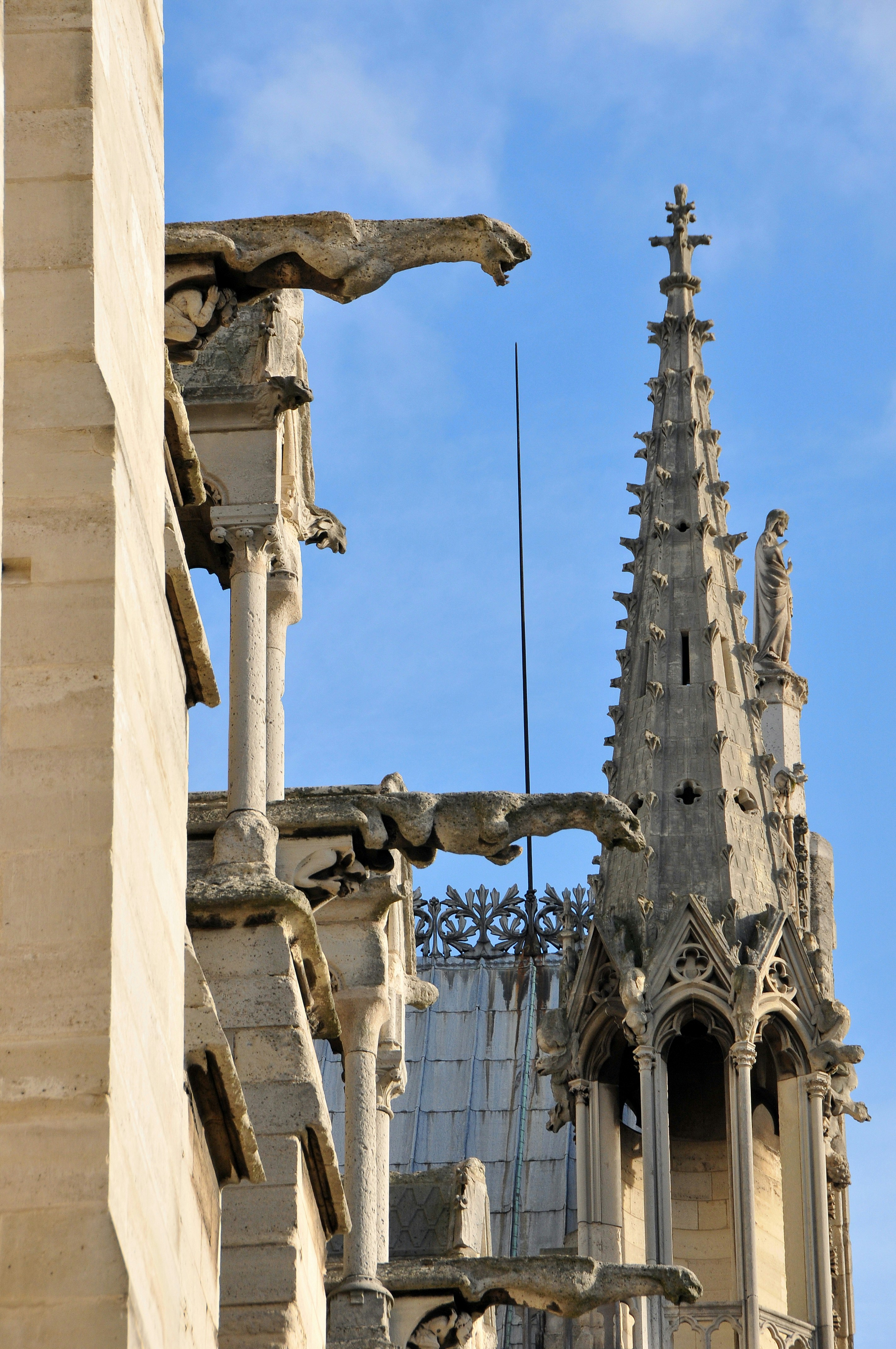 Gothic Spire Against a Clear Blue Roofline