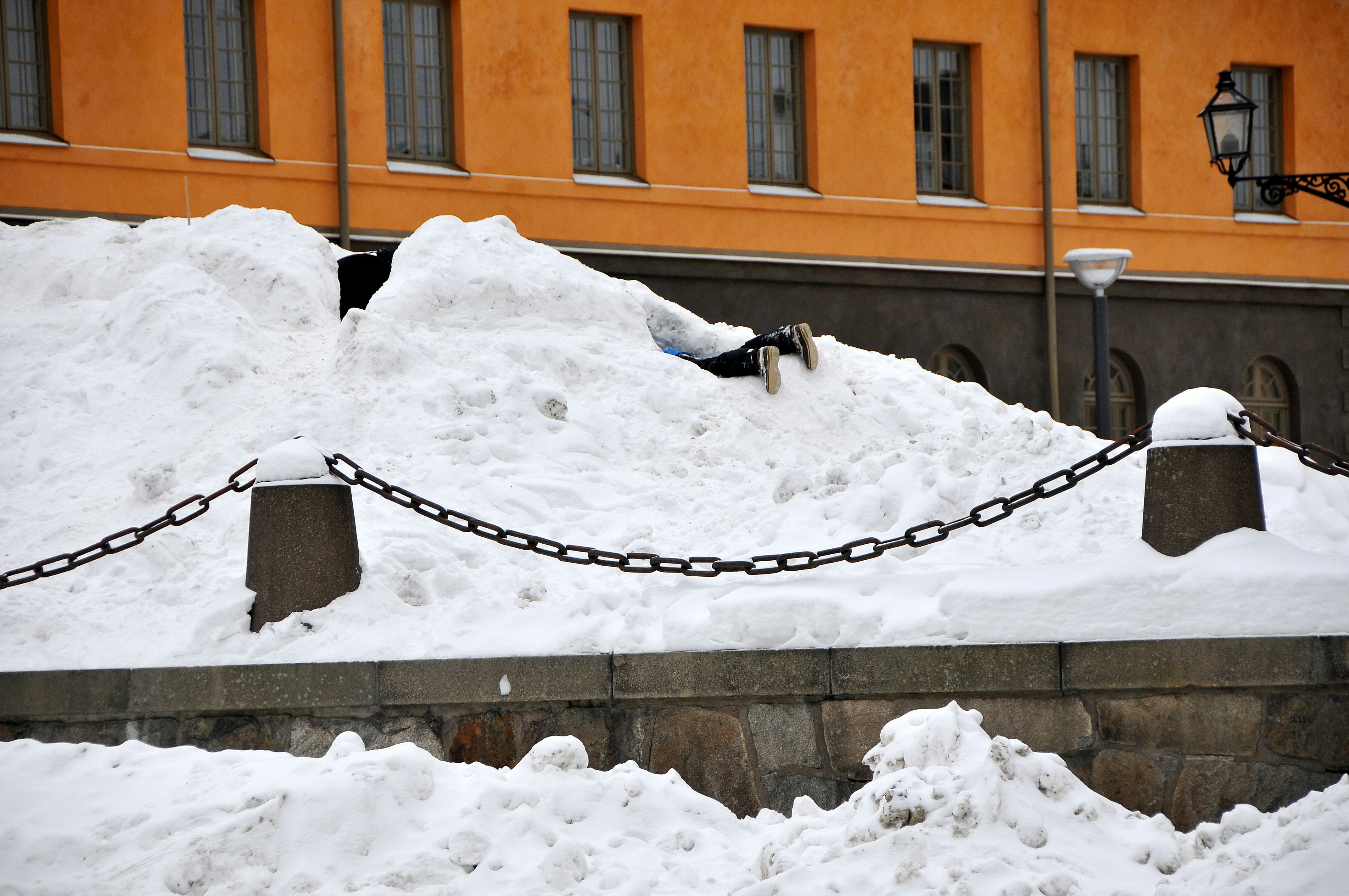 Snowbound Chain Across a Historic Courtyard