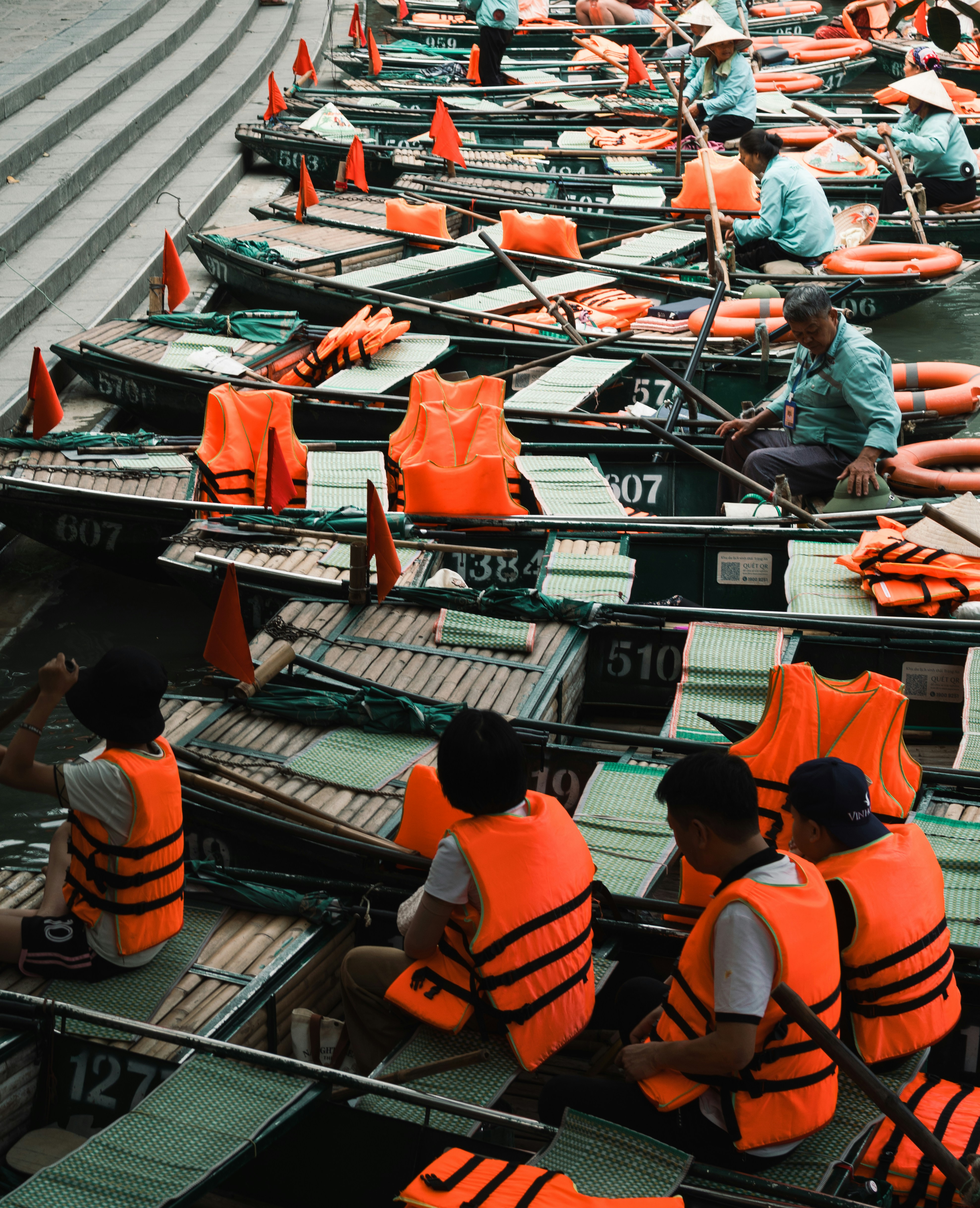 Orange-Vest Fleet at the Waterway Lockstep