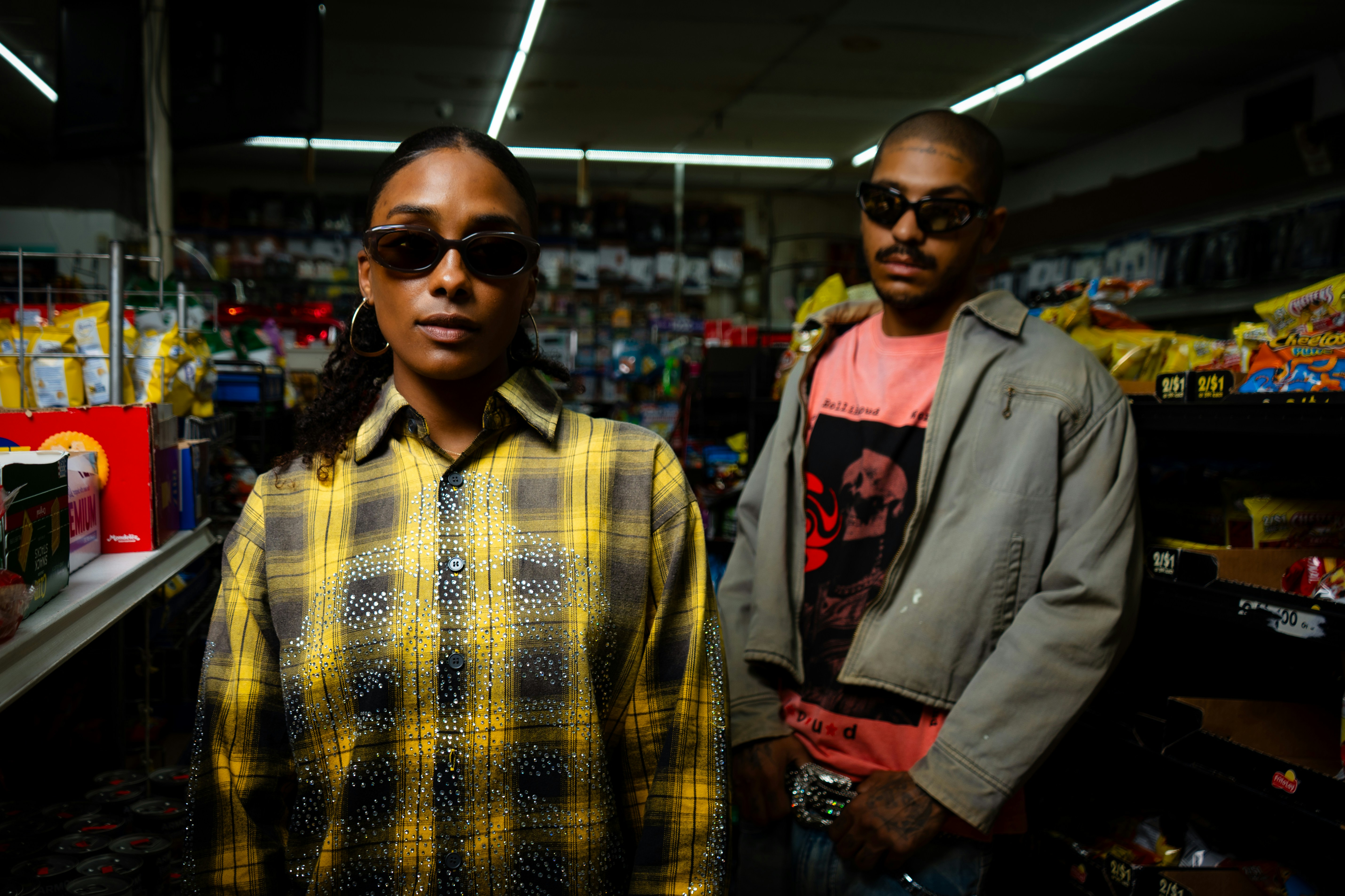 Behind the Aisles: Quiet Confidence in a Neon Grocery Glow