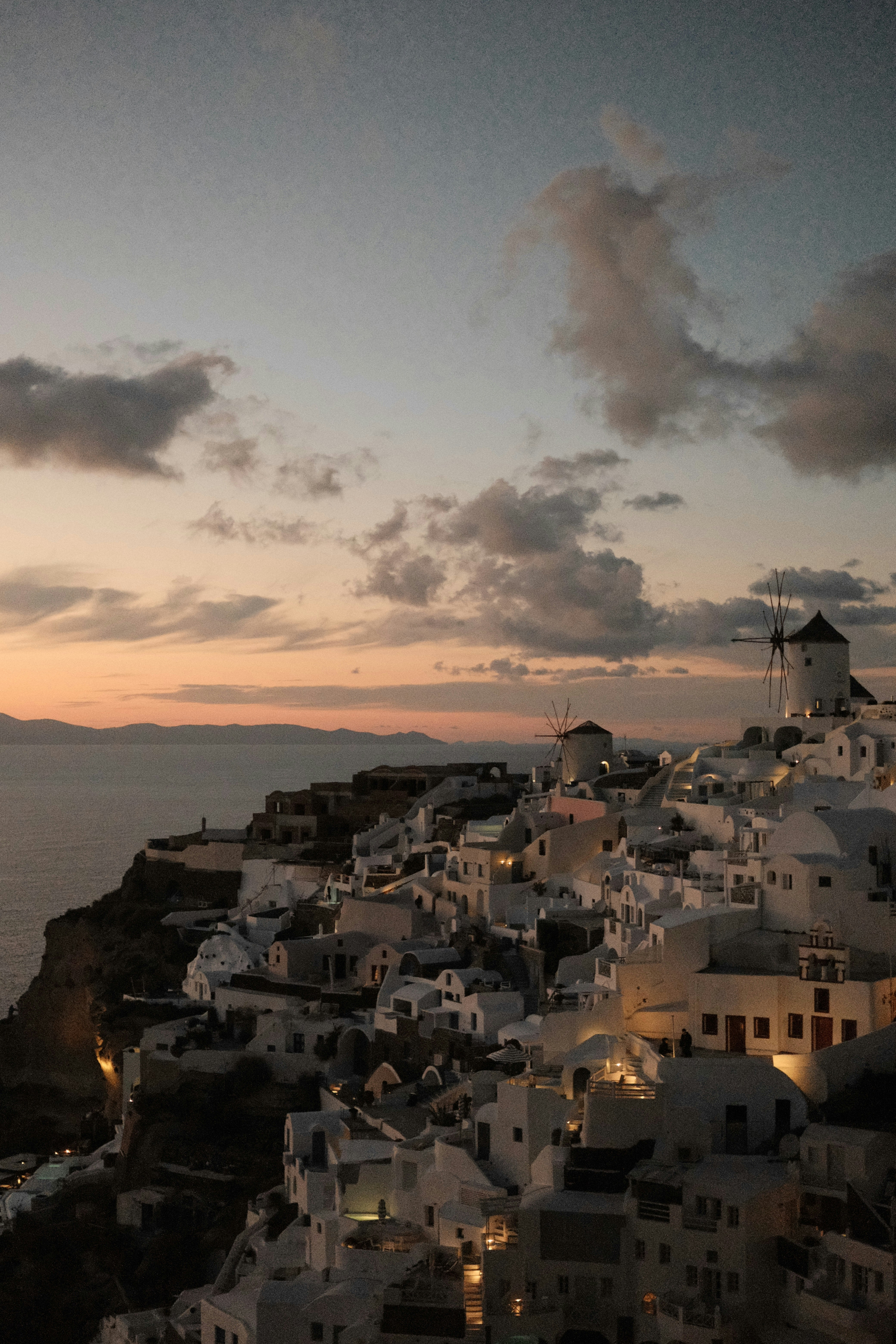 Sunset Over Whitewashed Cliffs: Santorini’s Quiet Settlement