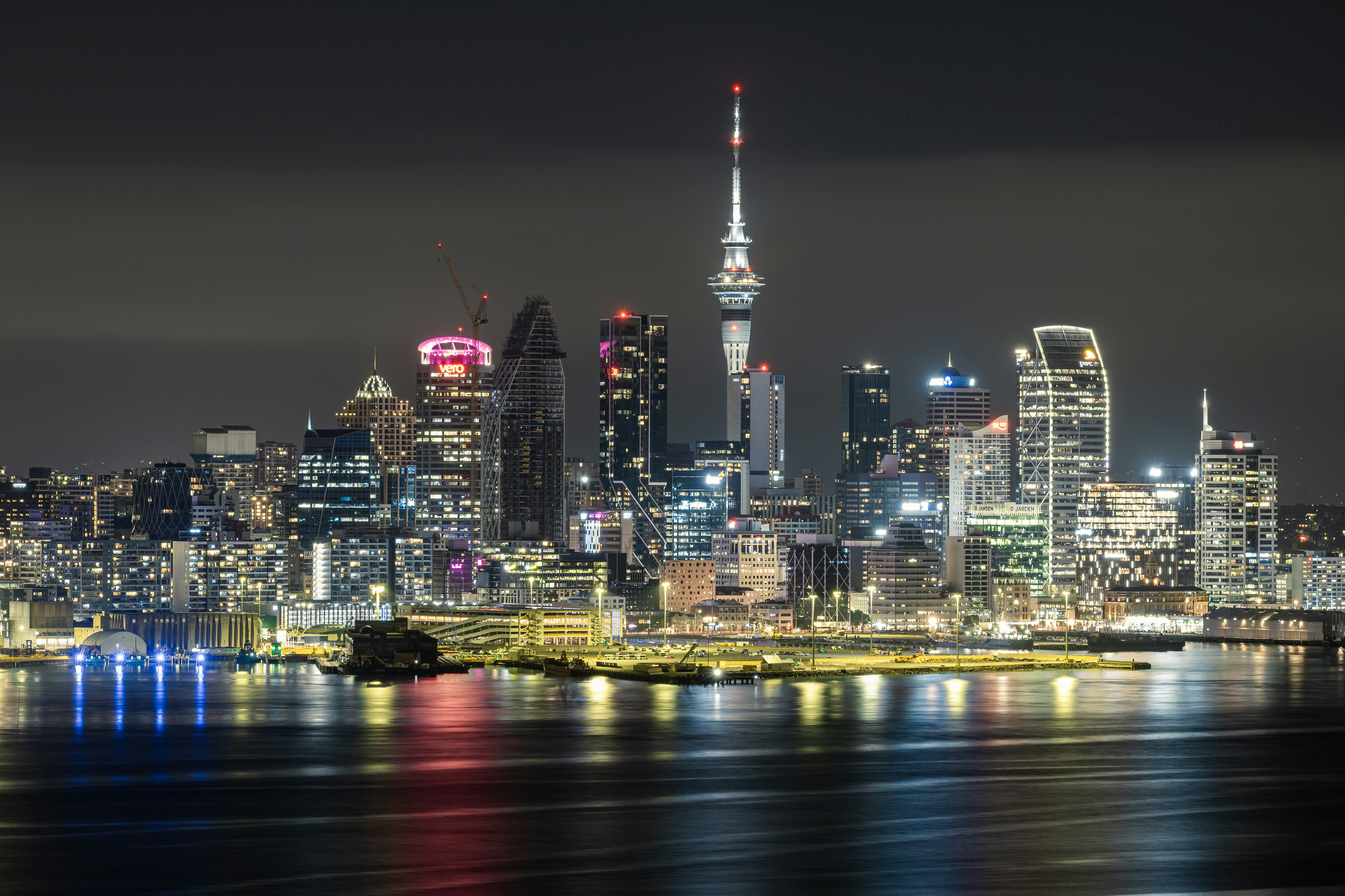 Midnight Marina: City Lights on Still Waters