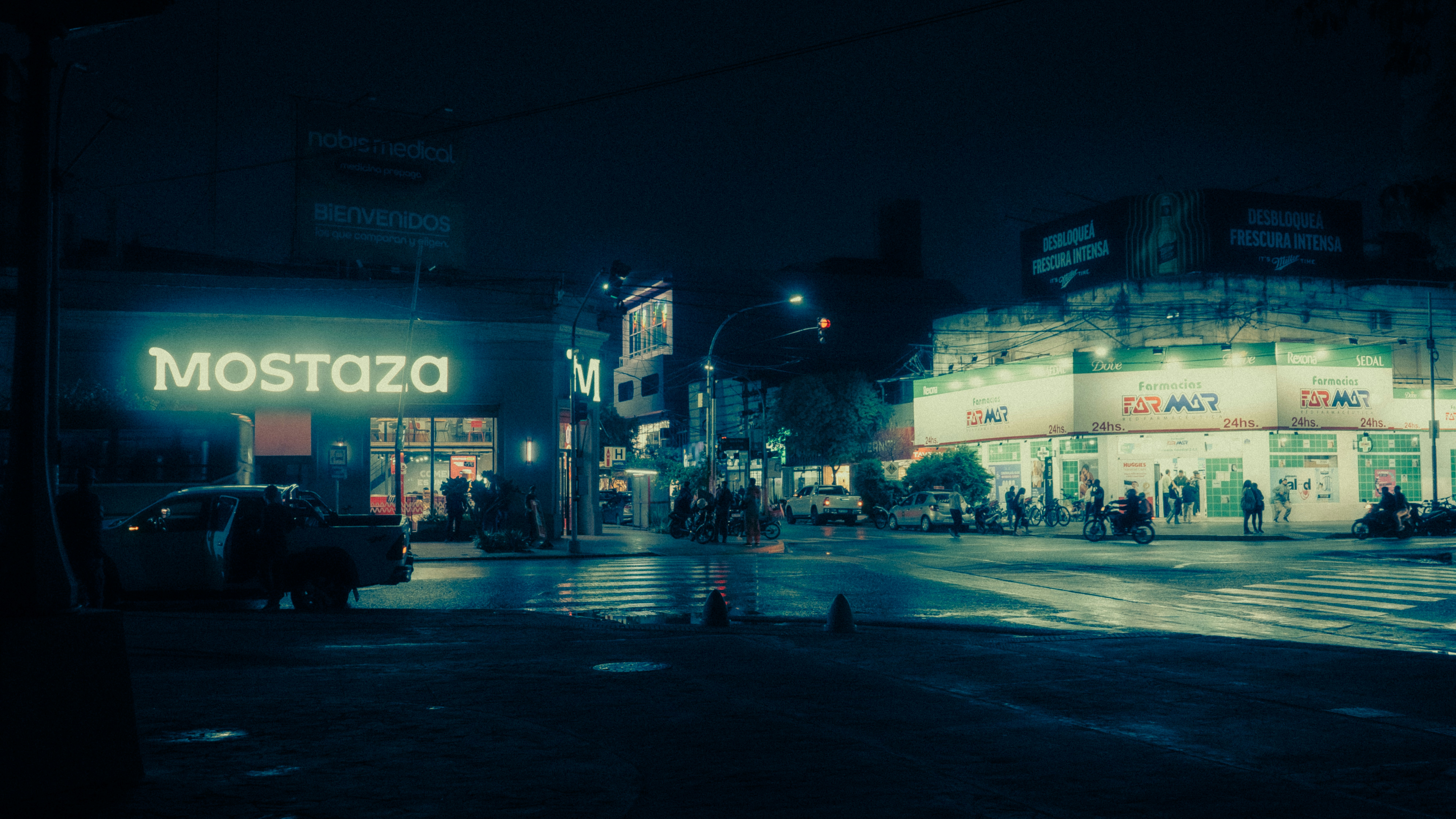 Neon Crossroads: Nightlife Pulse on a Luminous Avenuescape