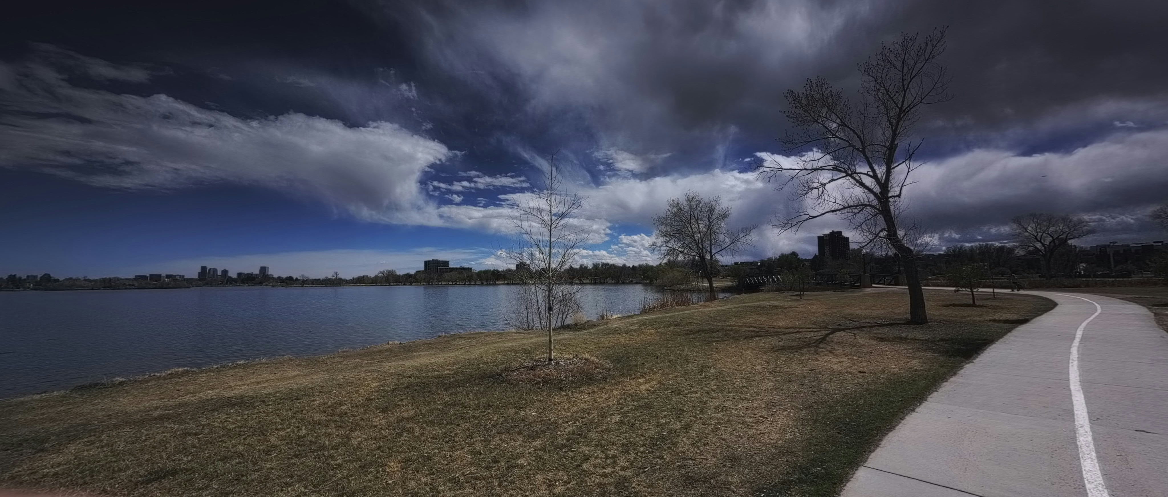 Lakeside Path under Dramatic Sky